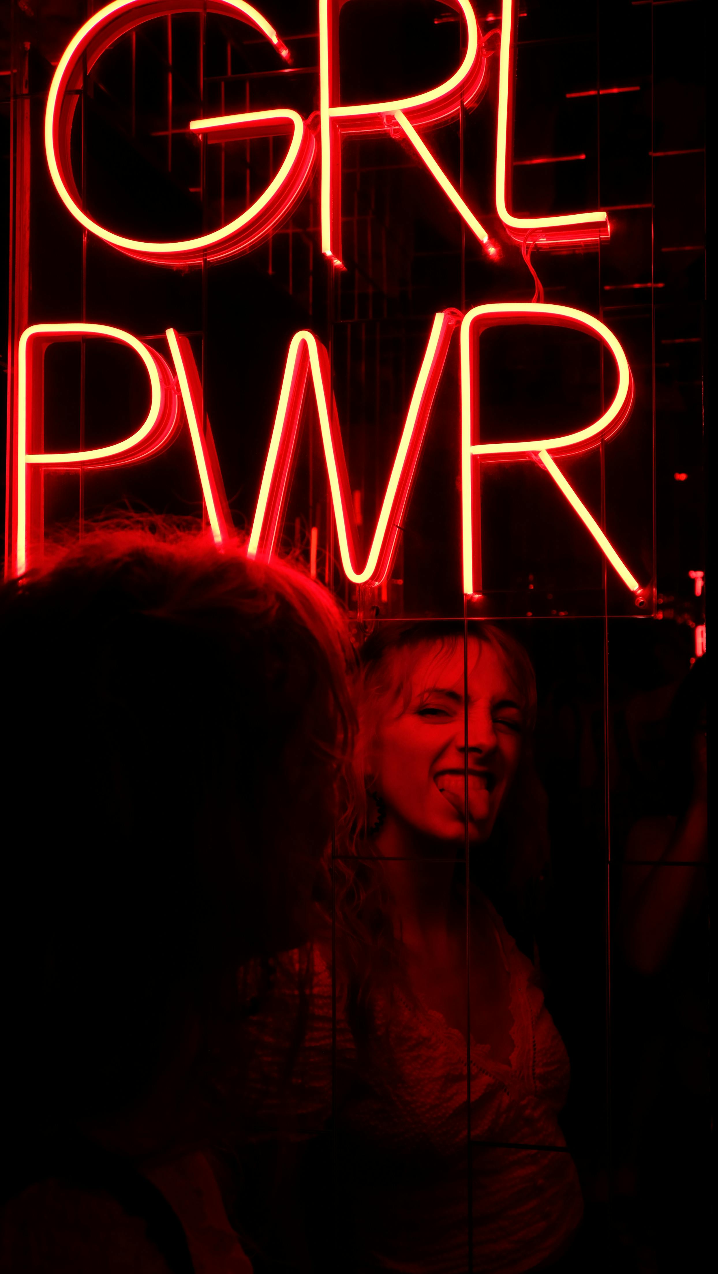 Empowering Neon Sign with Woman at Night · Free Stock Photo