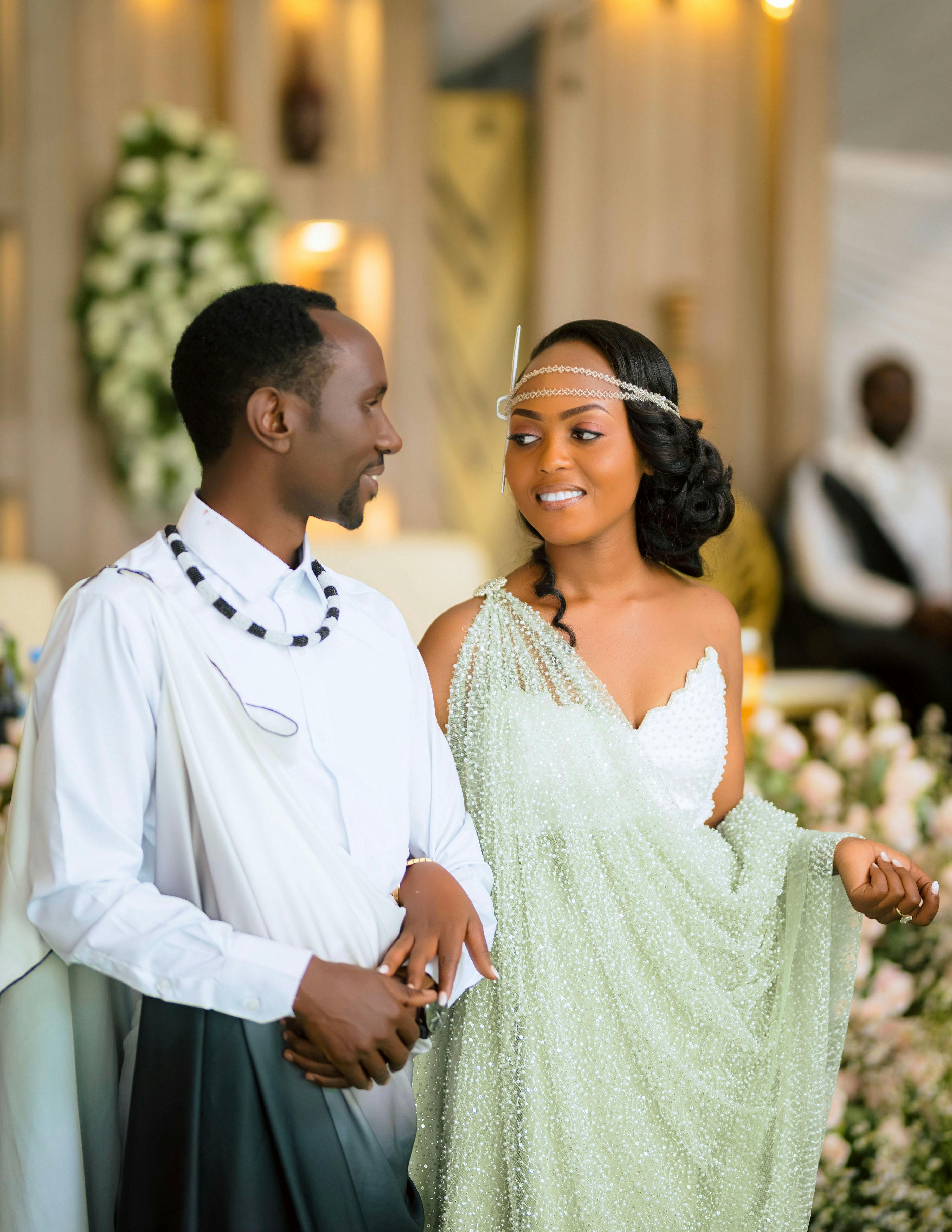 Elegant African Wedding Couple in Traditional Attire · Free Stock Photo