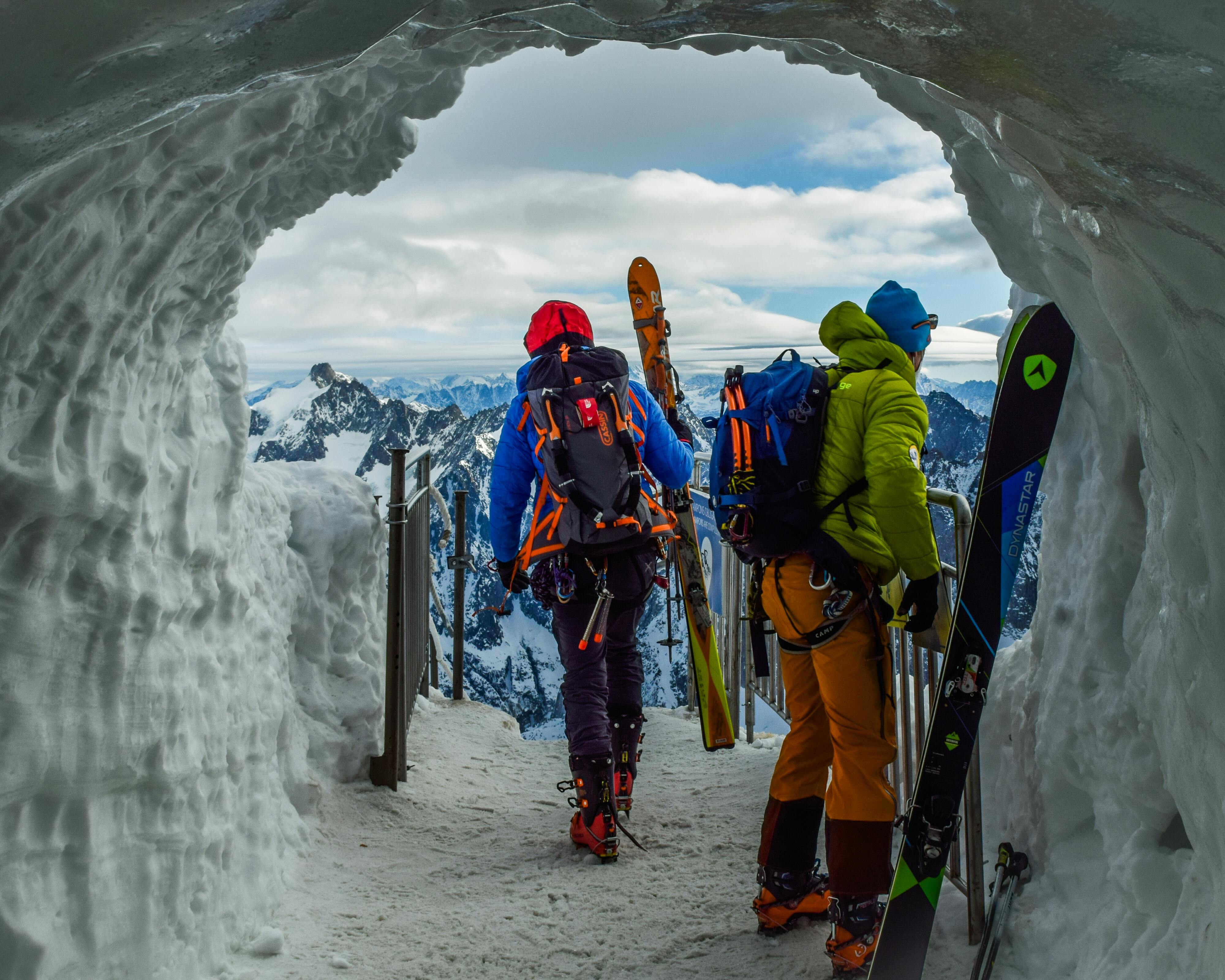 Skiers in Chamonix Tunnel with Mountain View · Free Stock Photo