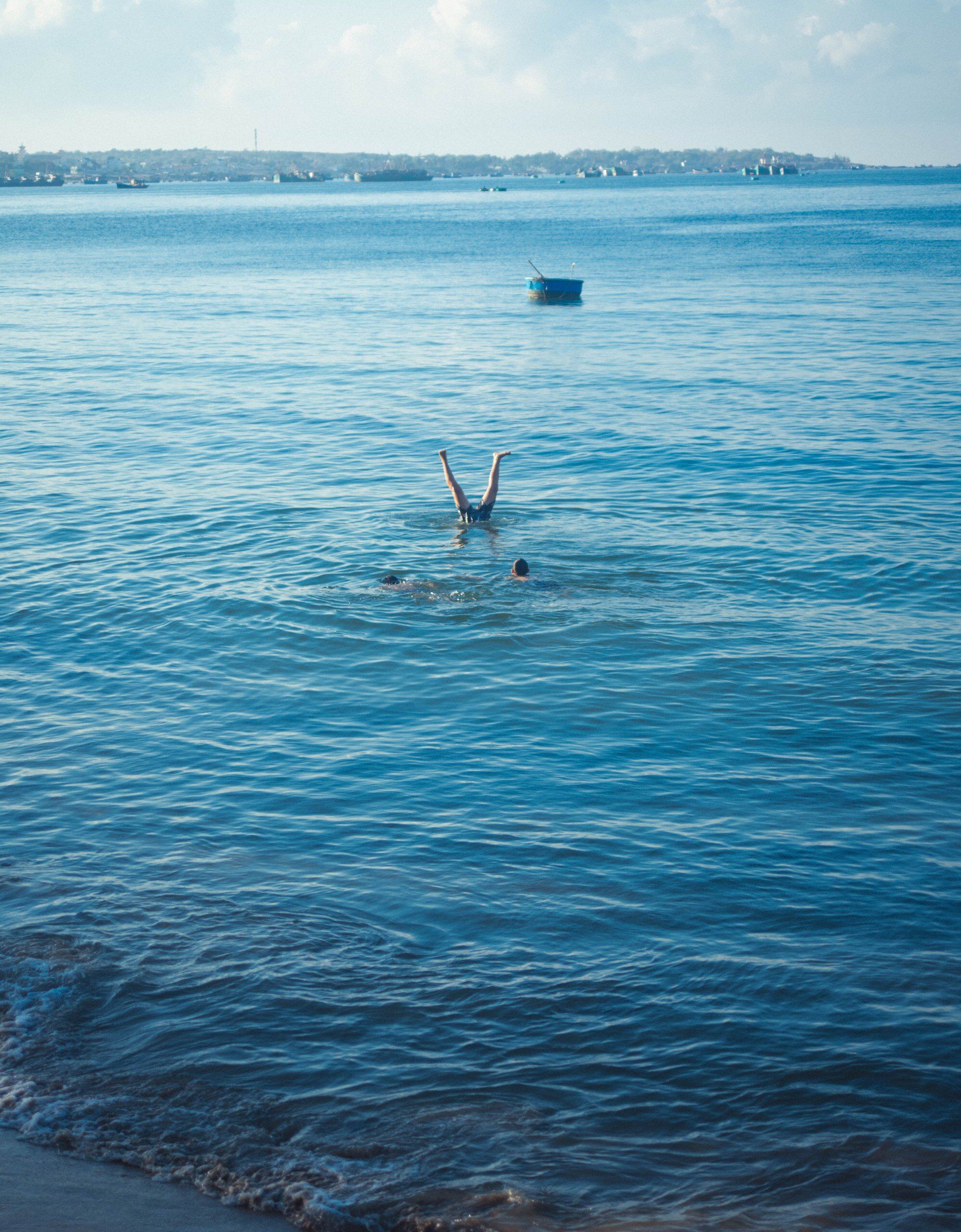 Person Enjoying a Refreshing Swim in the Ocean · Free Stock Photo