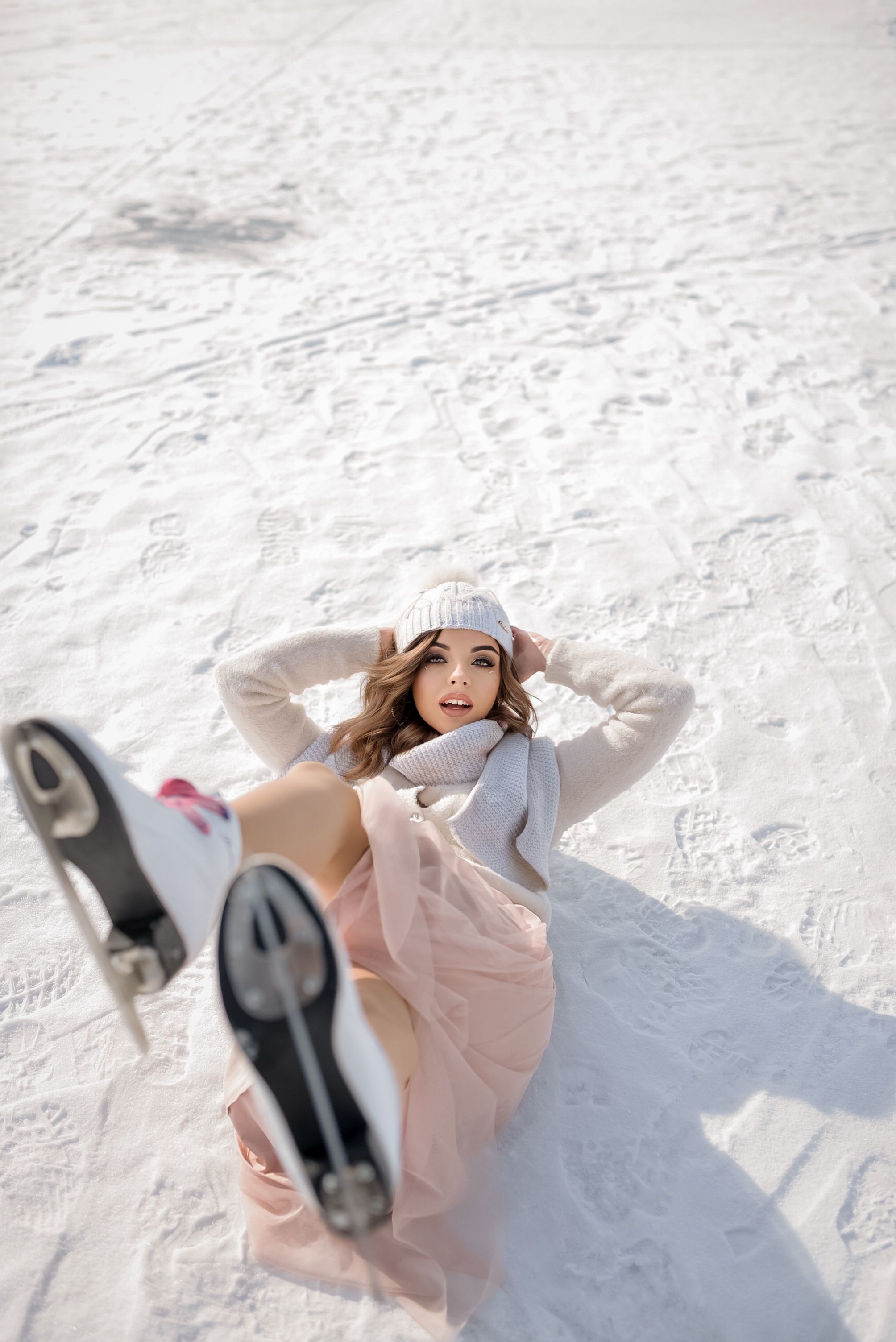 Young Woman Enjoying Winter Ice Skating Outdoors · Free Stock Photo