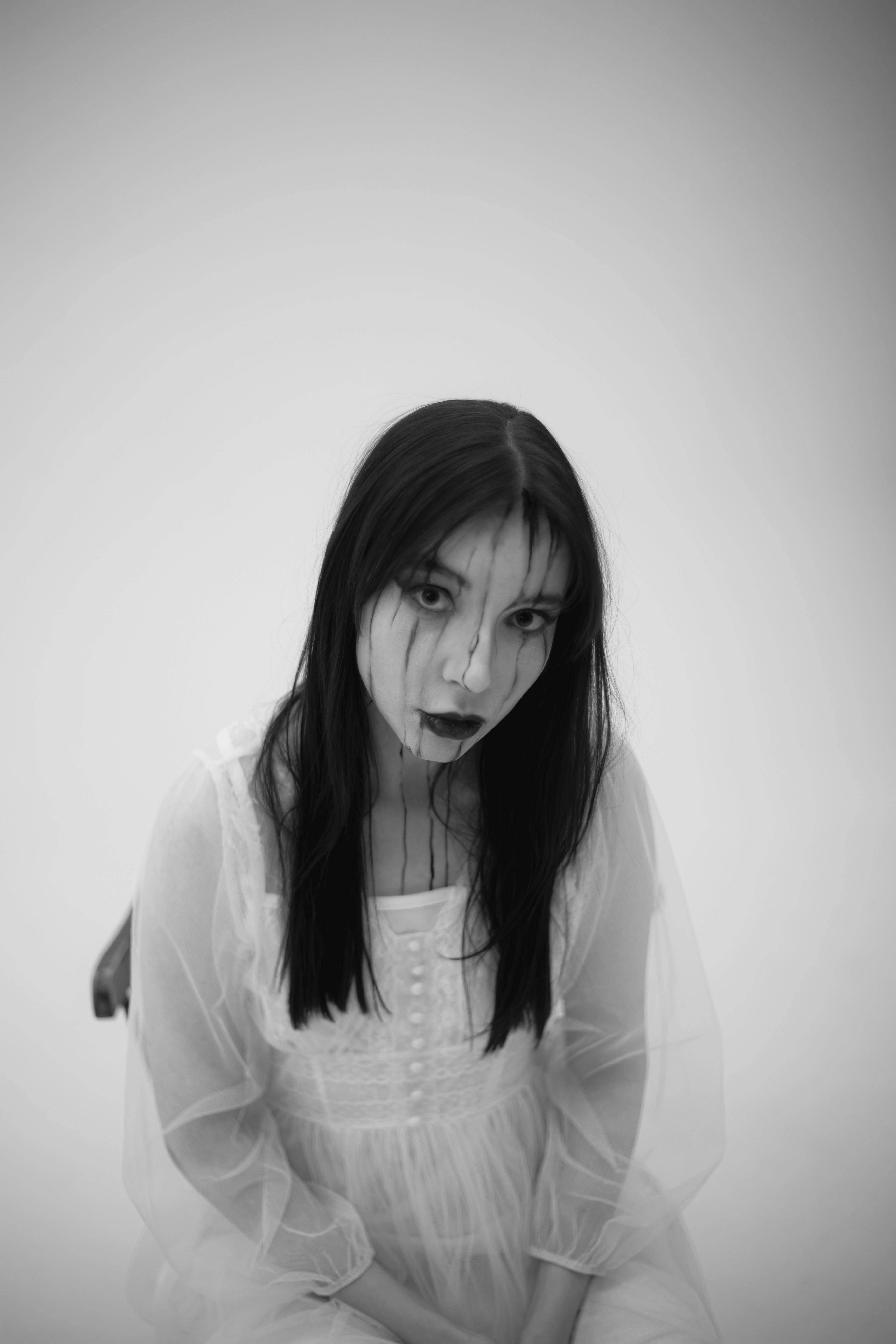 Moody Portrait of Woman in Sheer Dress · Free Stock Photo