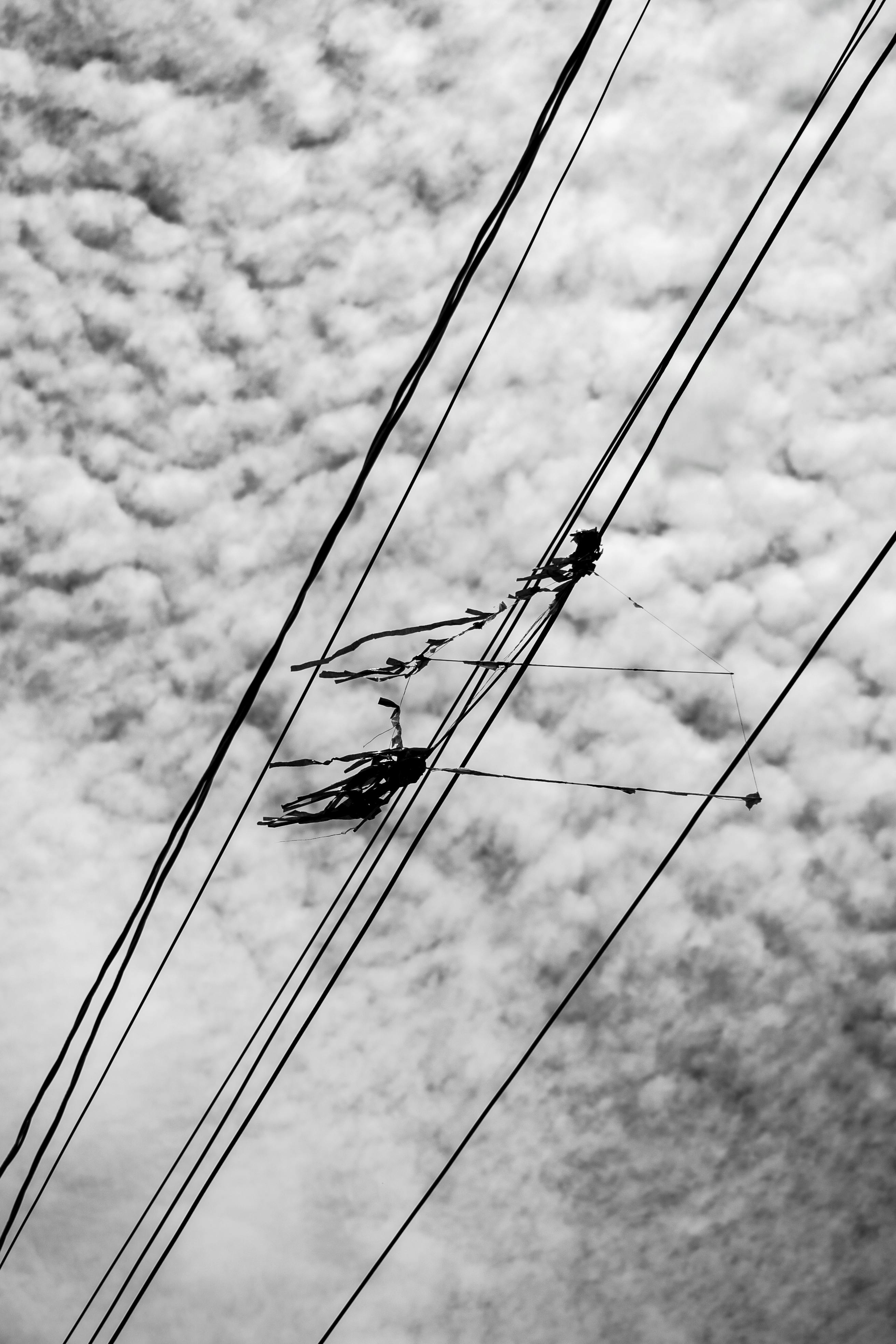 Broken Power Lines Against Cloudy Sky · Free Stock Photo