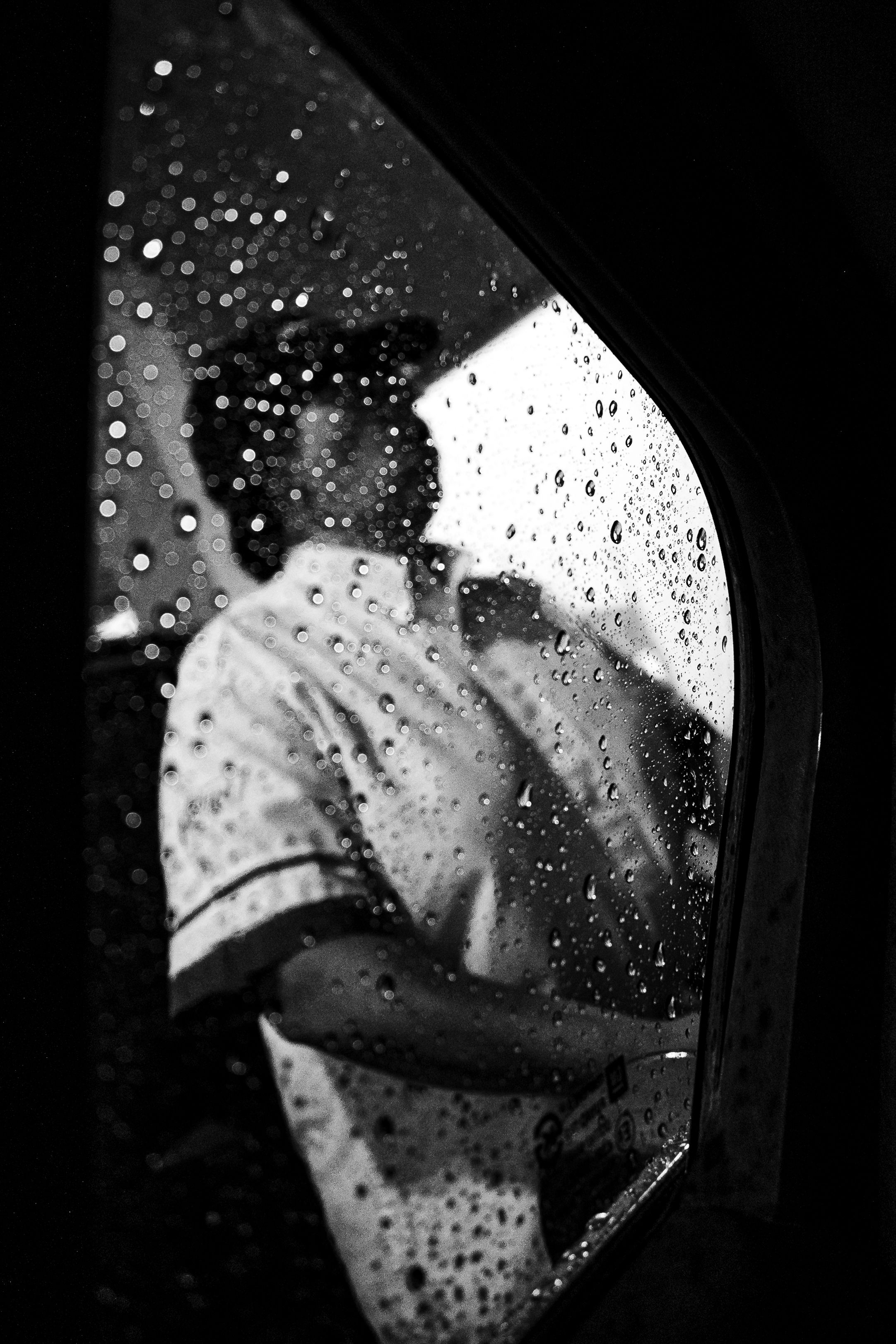 Moody Rainy Portrait through Window Glass · Free Stock Photo