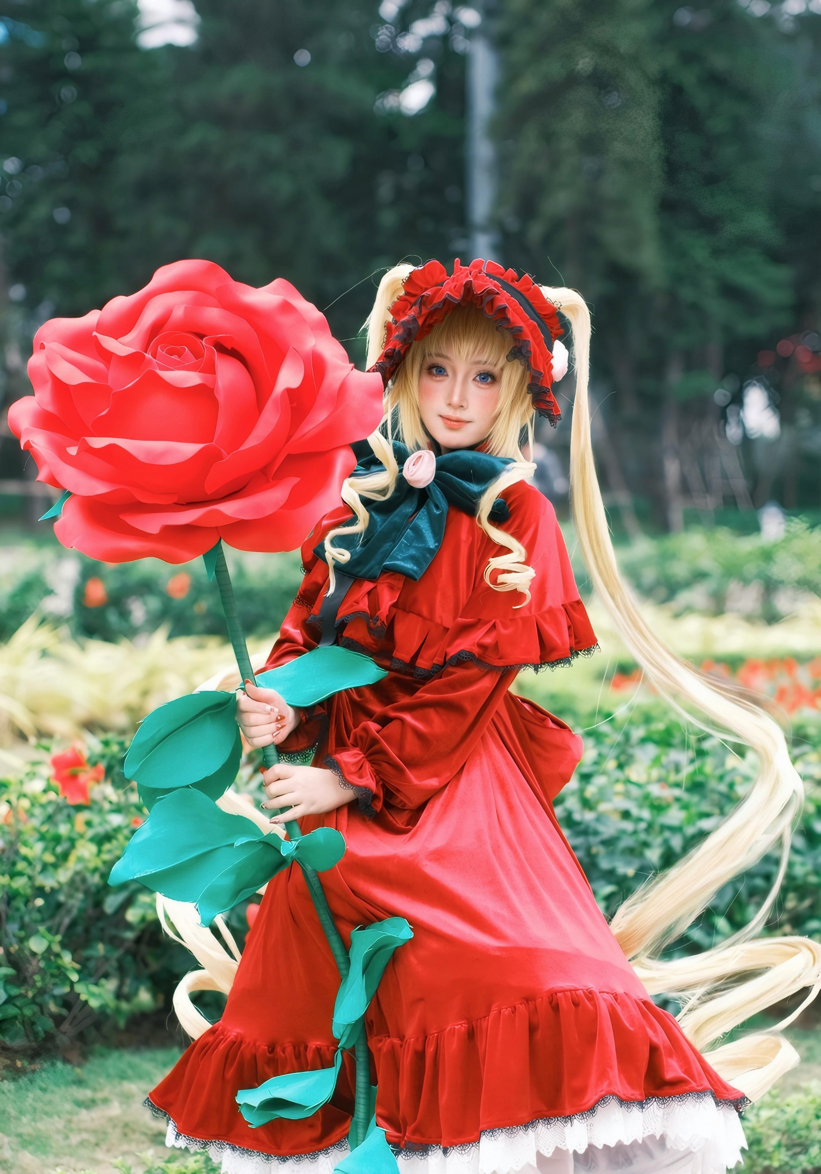 Fantasy Cosplay with Oversized Red Rose · Free Stock Photo