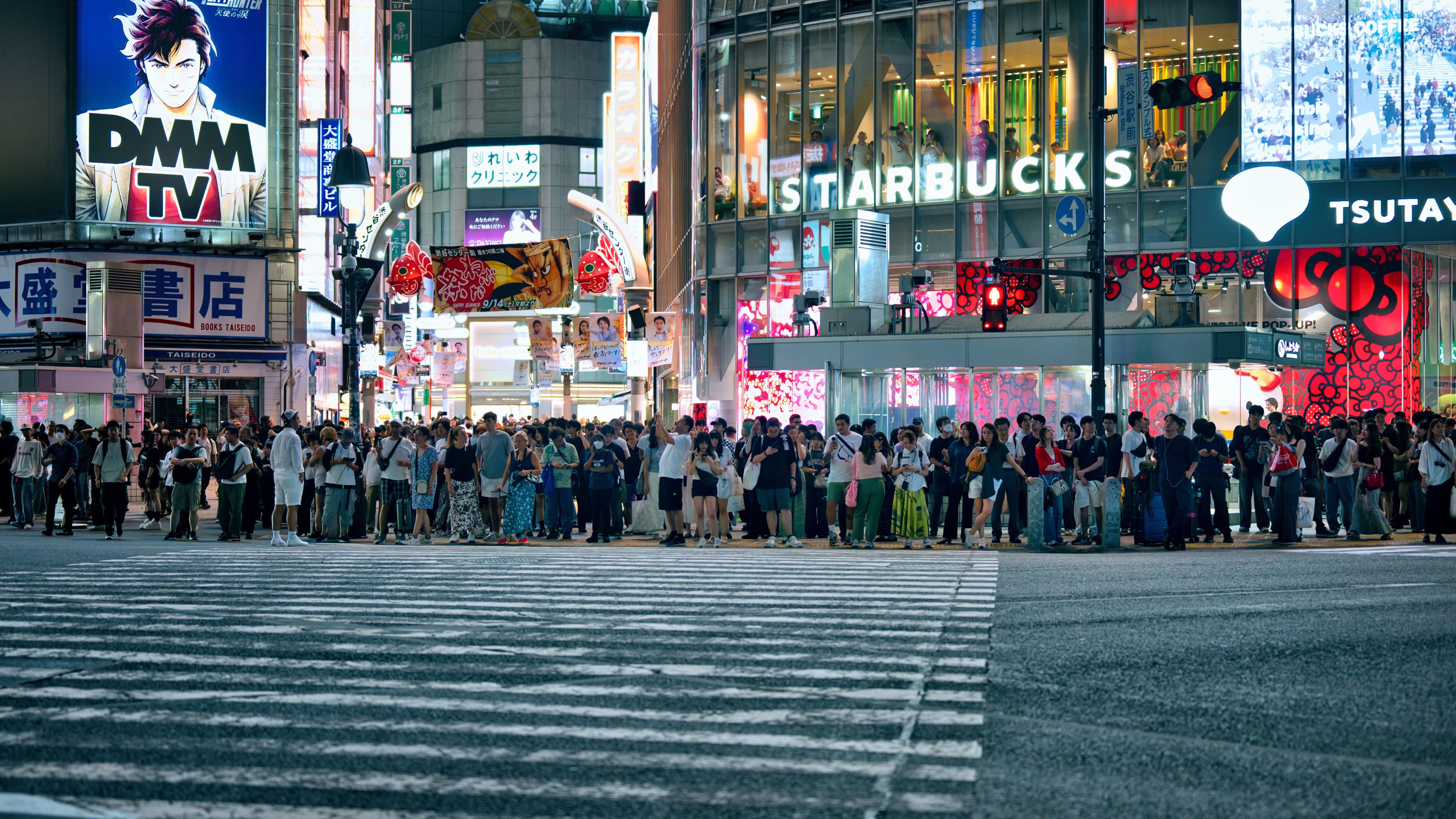 Crowd at Shibuya Crossing in Tokyo at Night · Free Stock Photo