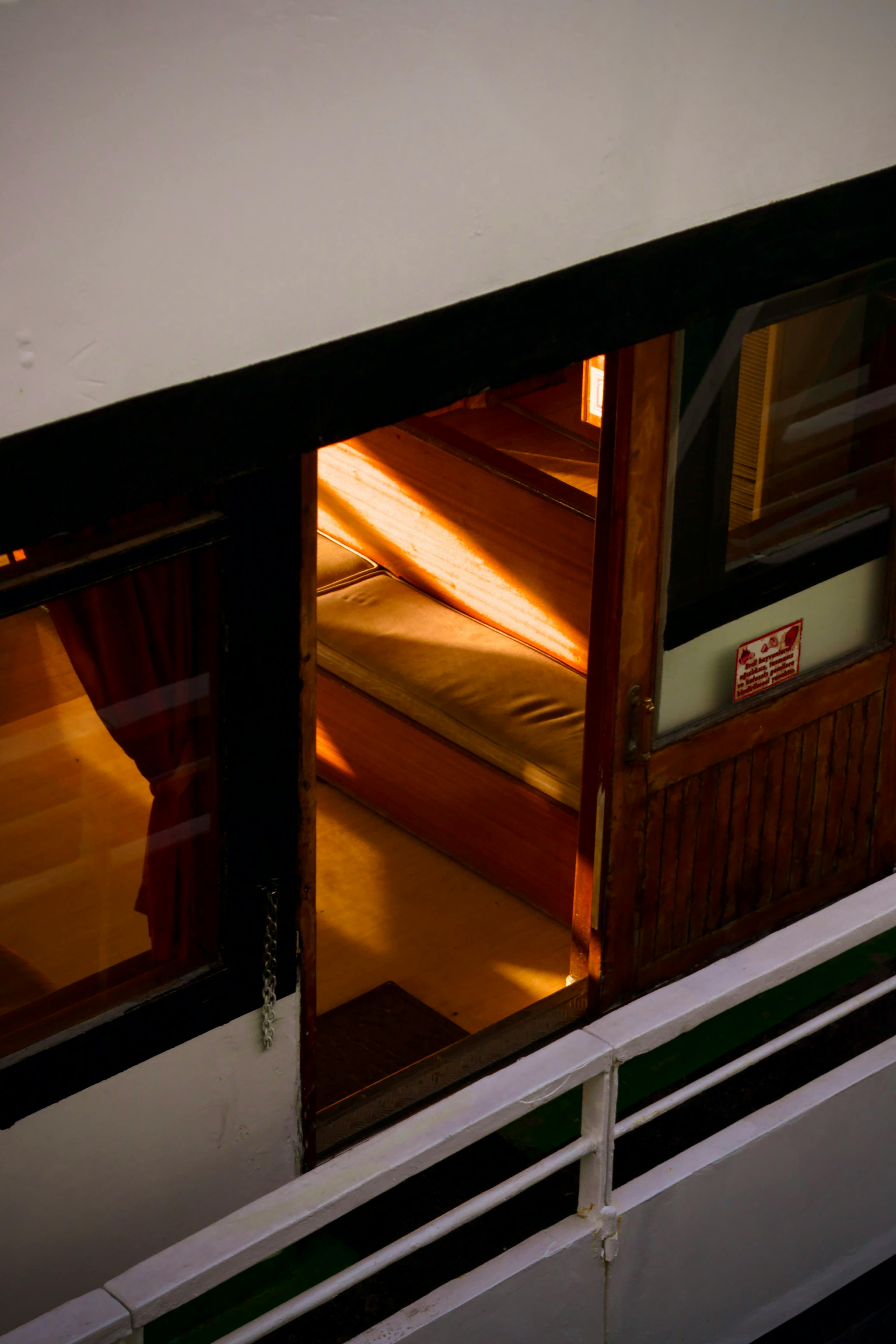Cozy Boat Cabin with Sunlit Interior · Free Stock Photo