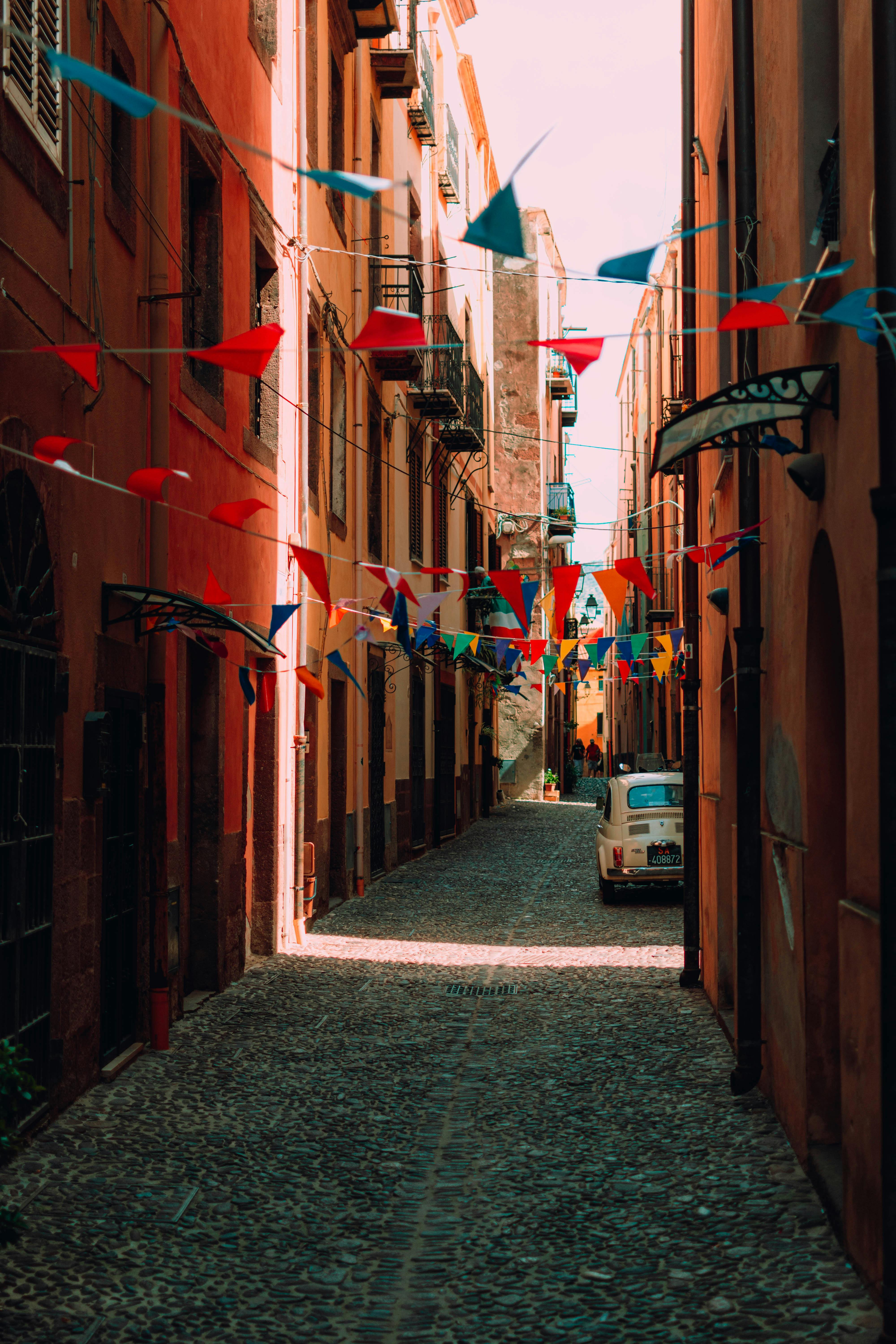 Colorful Street Decorations in Mediterranean Alley · Free Stock Photo