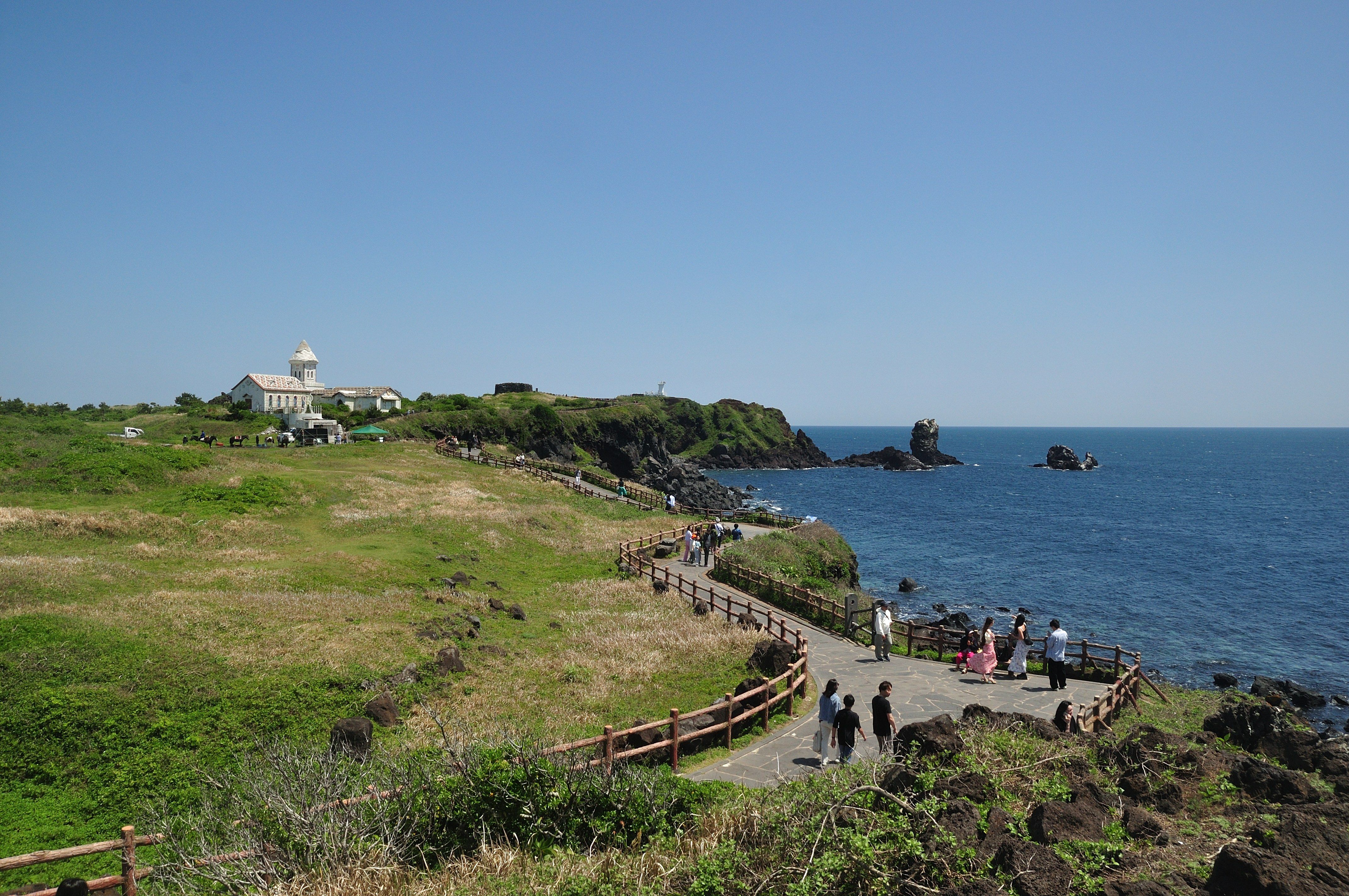 Scenic view of Jeju Island coastline and path · Free Stock Photo
