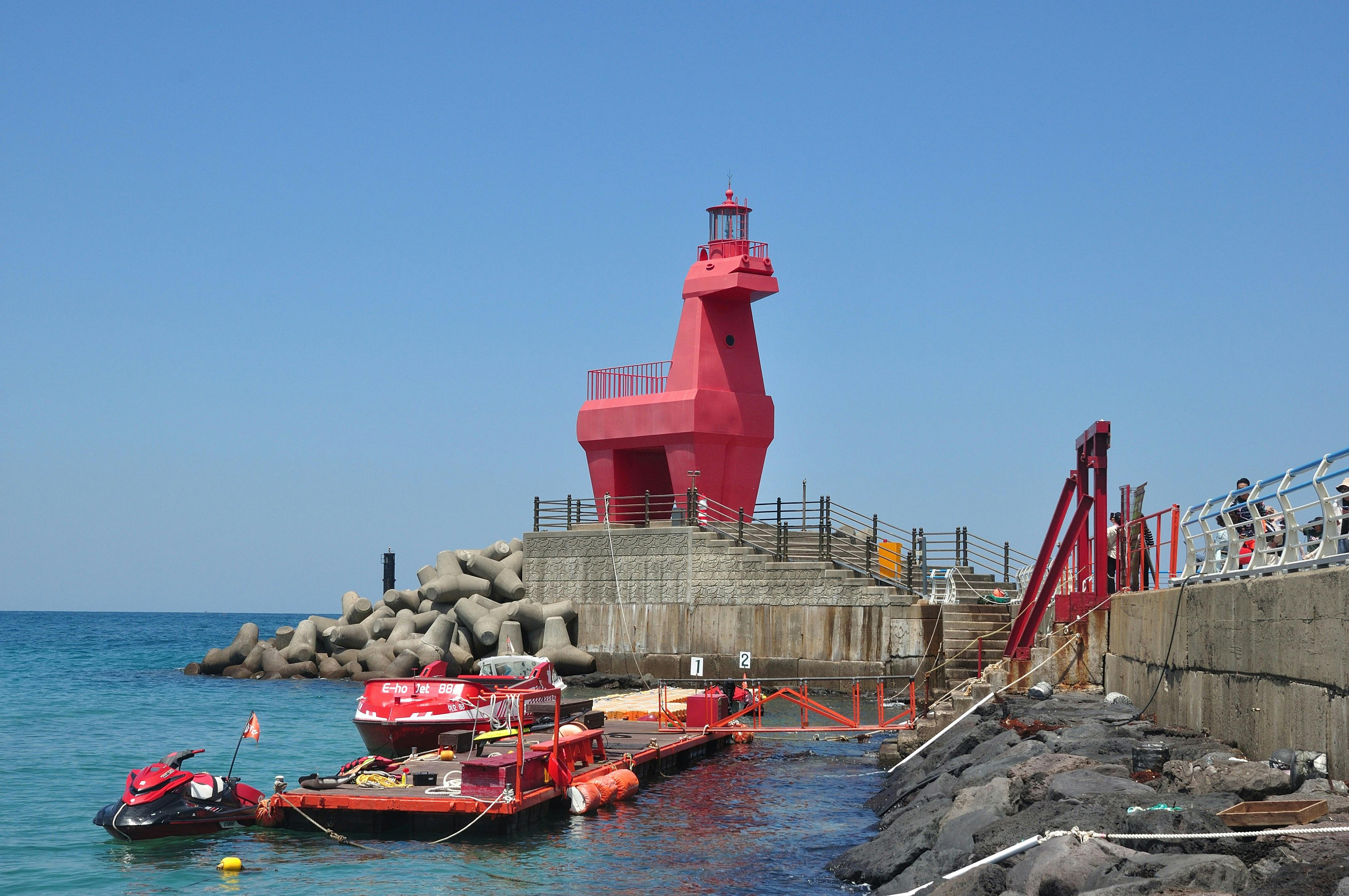 Red Horse Lighthouse on Korean Seaside Pier · Free Stock Photo