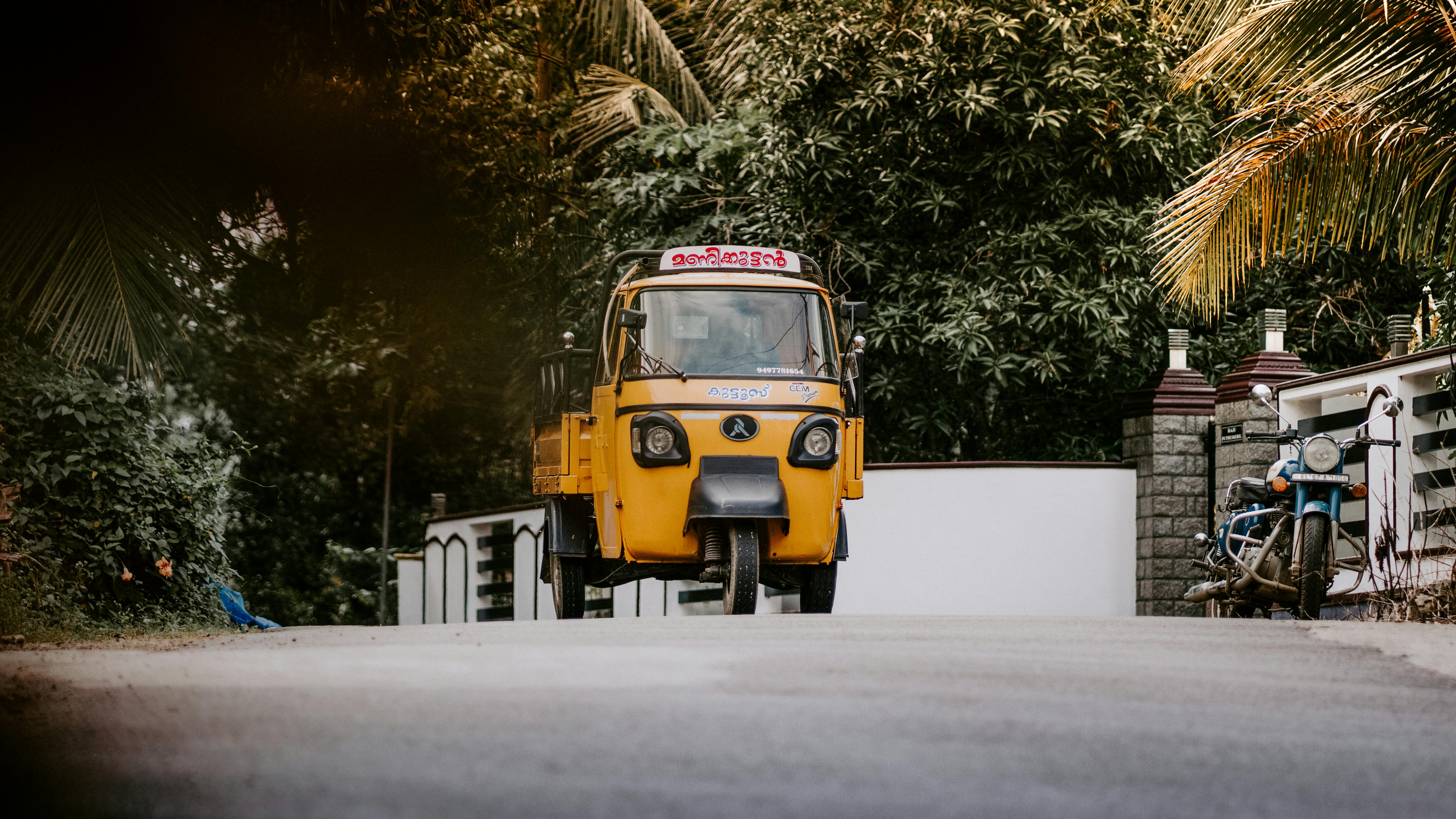 Bright Yellow Auto Rickshaw in Kerala Street · Free Stock Photo