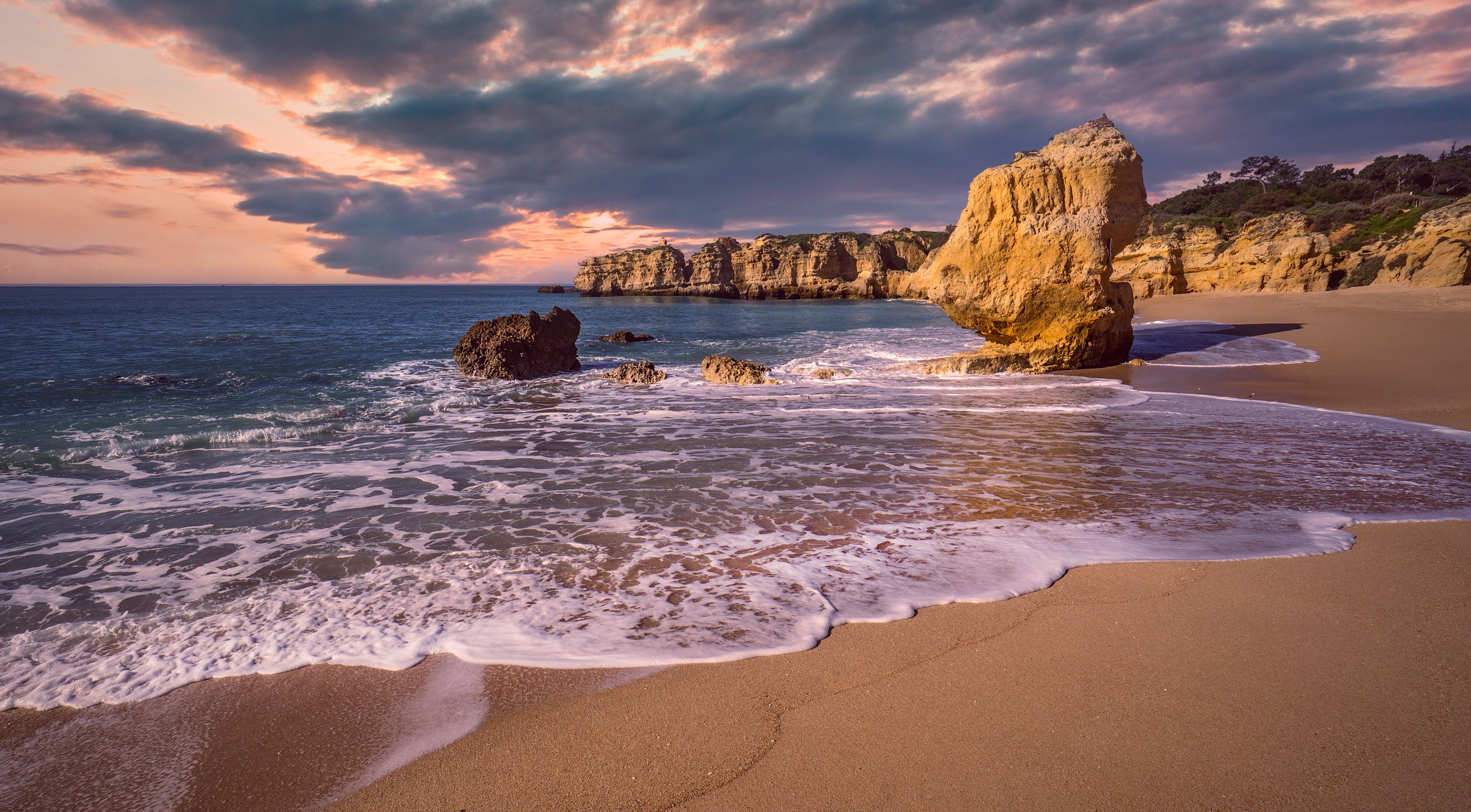 Stunning Algarve Beach at Sunset with Rock Formations · Free Stock Photo