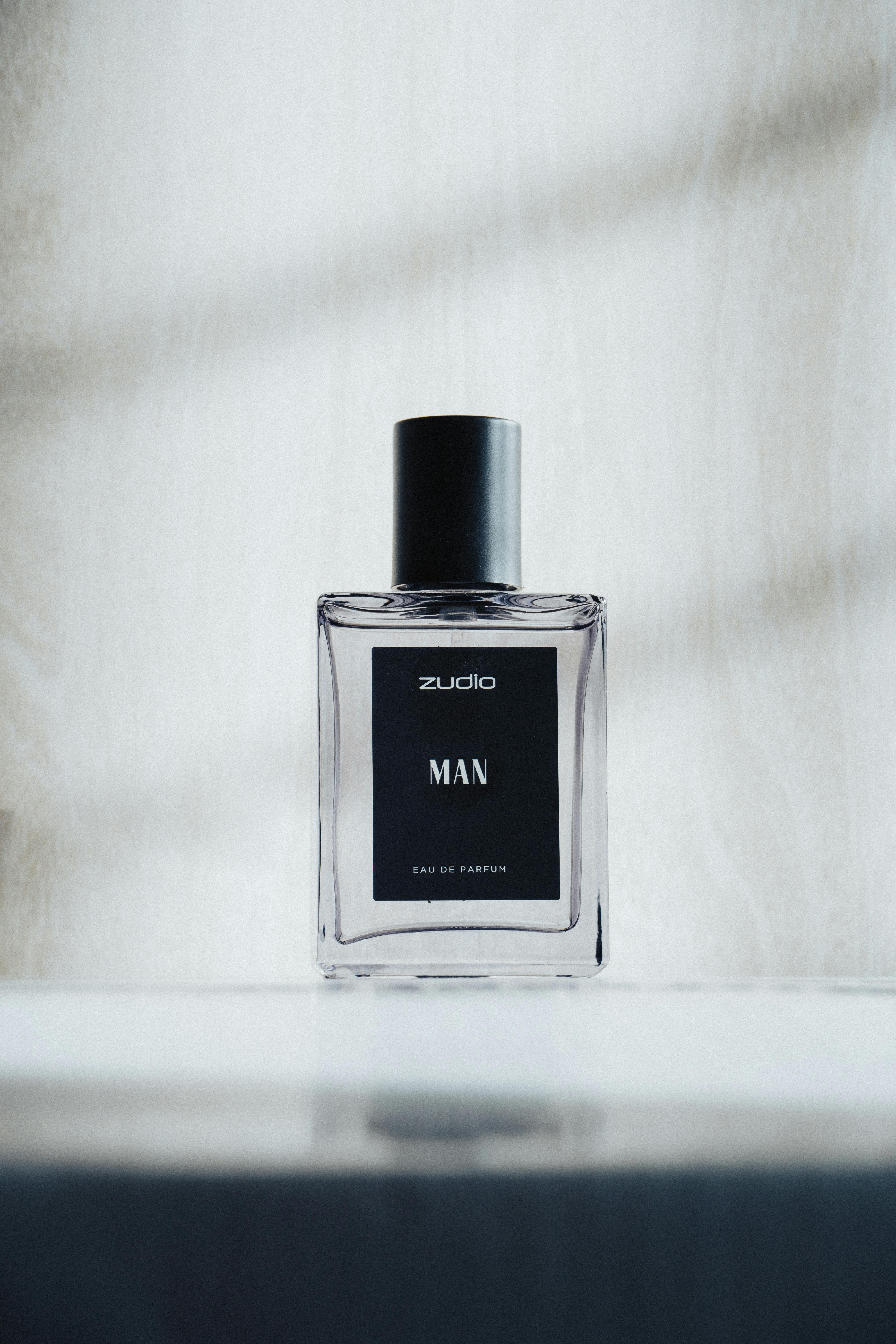 Elegant Perfume Bottle with Minimalist Design · Free Stock Photo