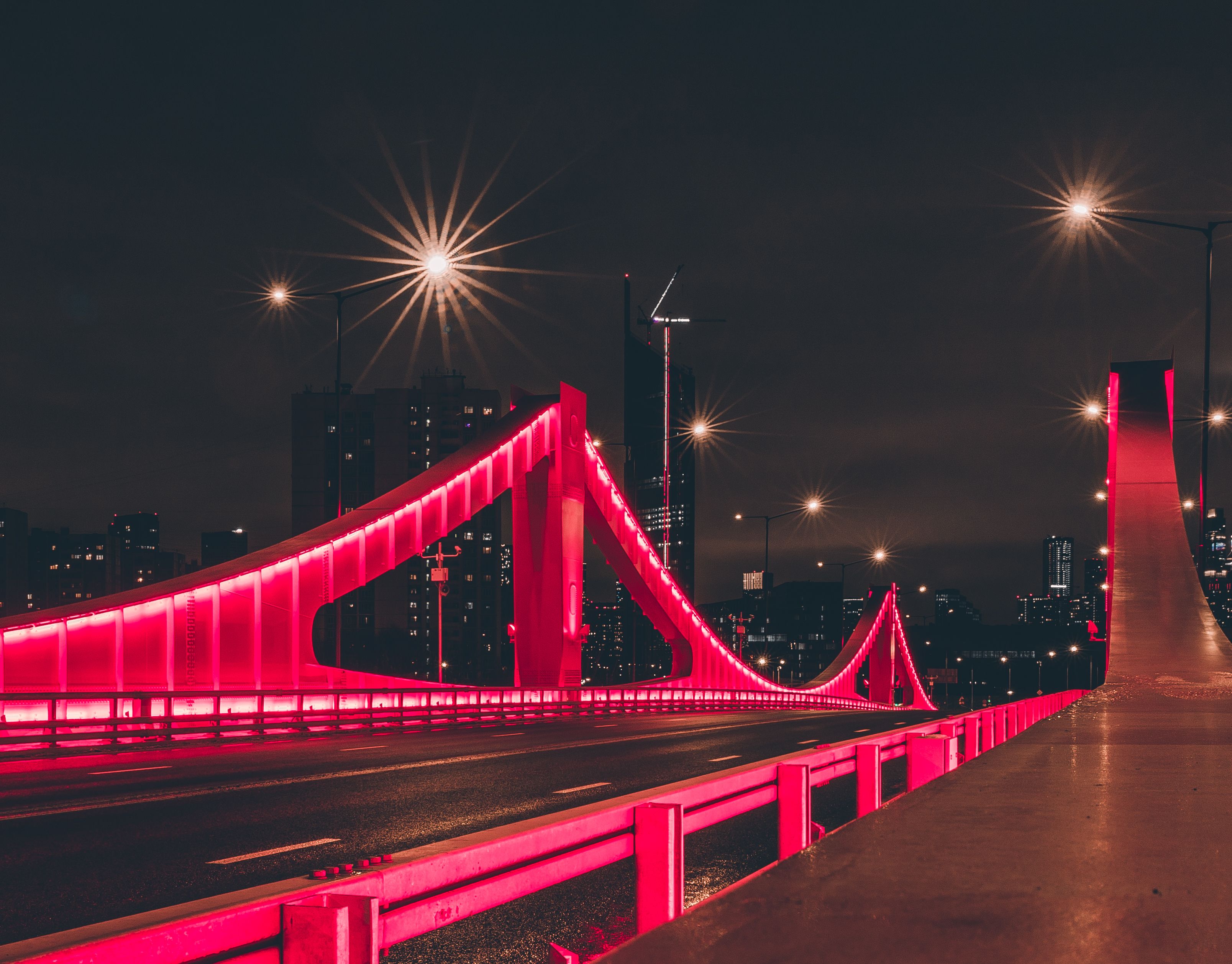 Nighttime view of illuminated red bridge · Free Stock Photo
