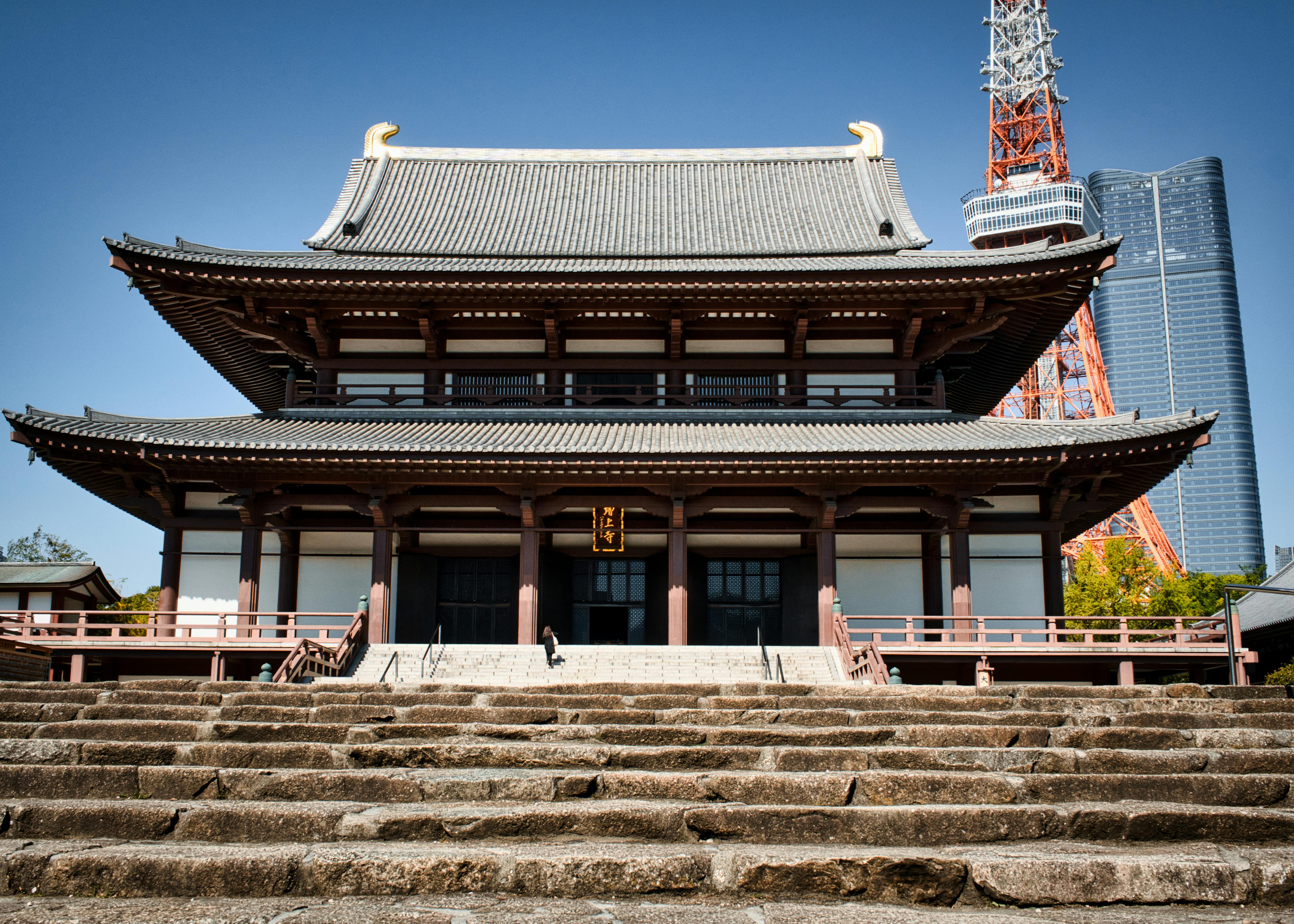 Tokyo Tower Behind Black and White Dojo Building during Daytime · Free ...