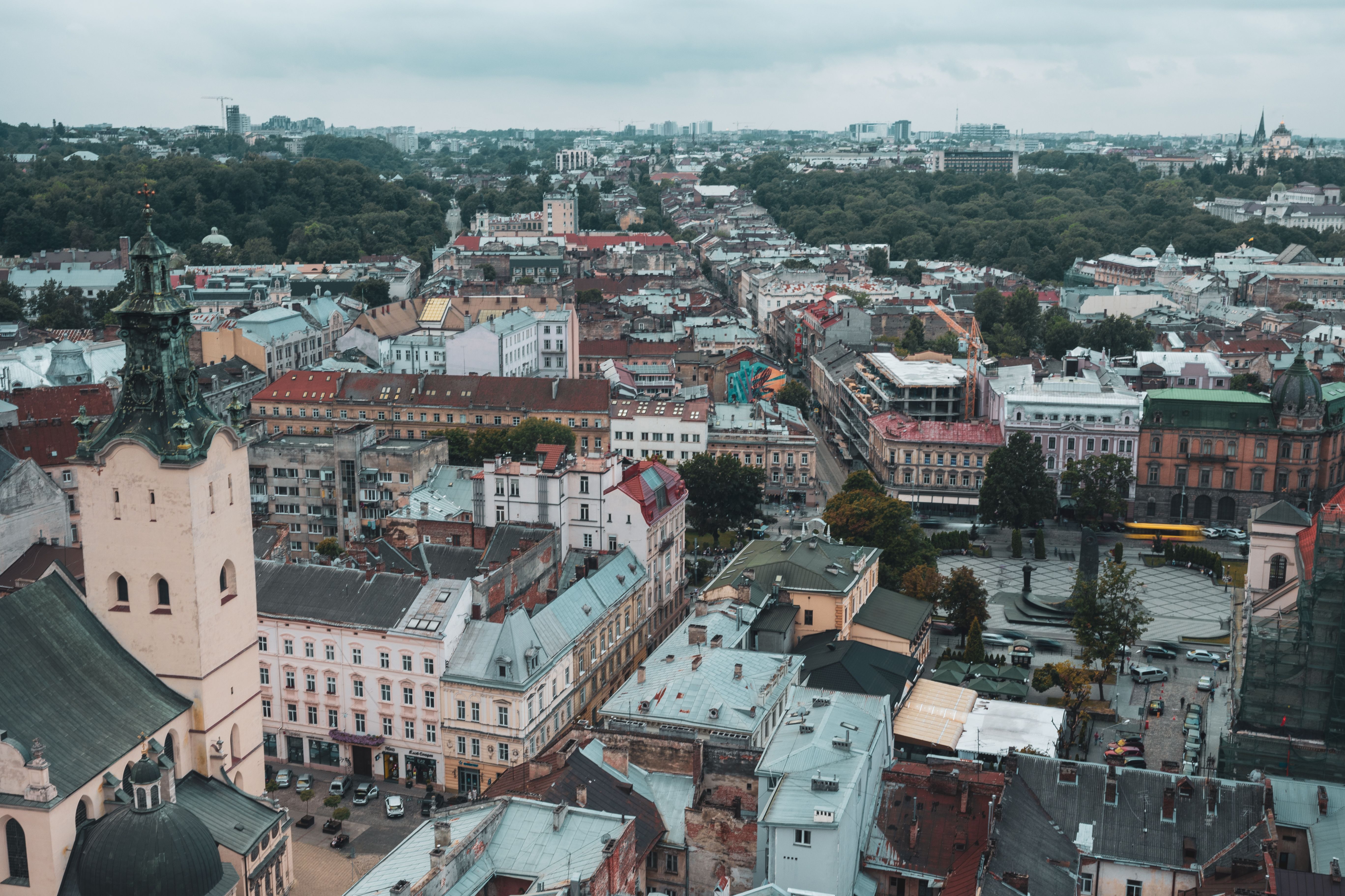 Aerial Photography of People Walking on City Street near Buildings ...