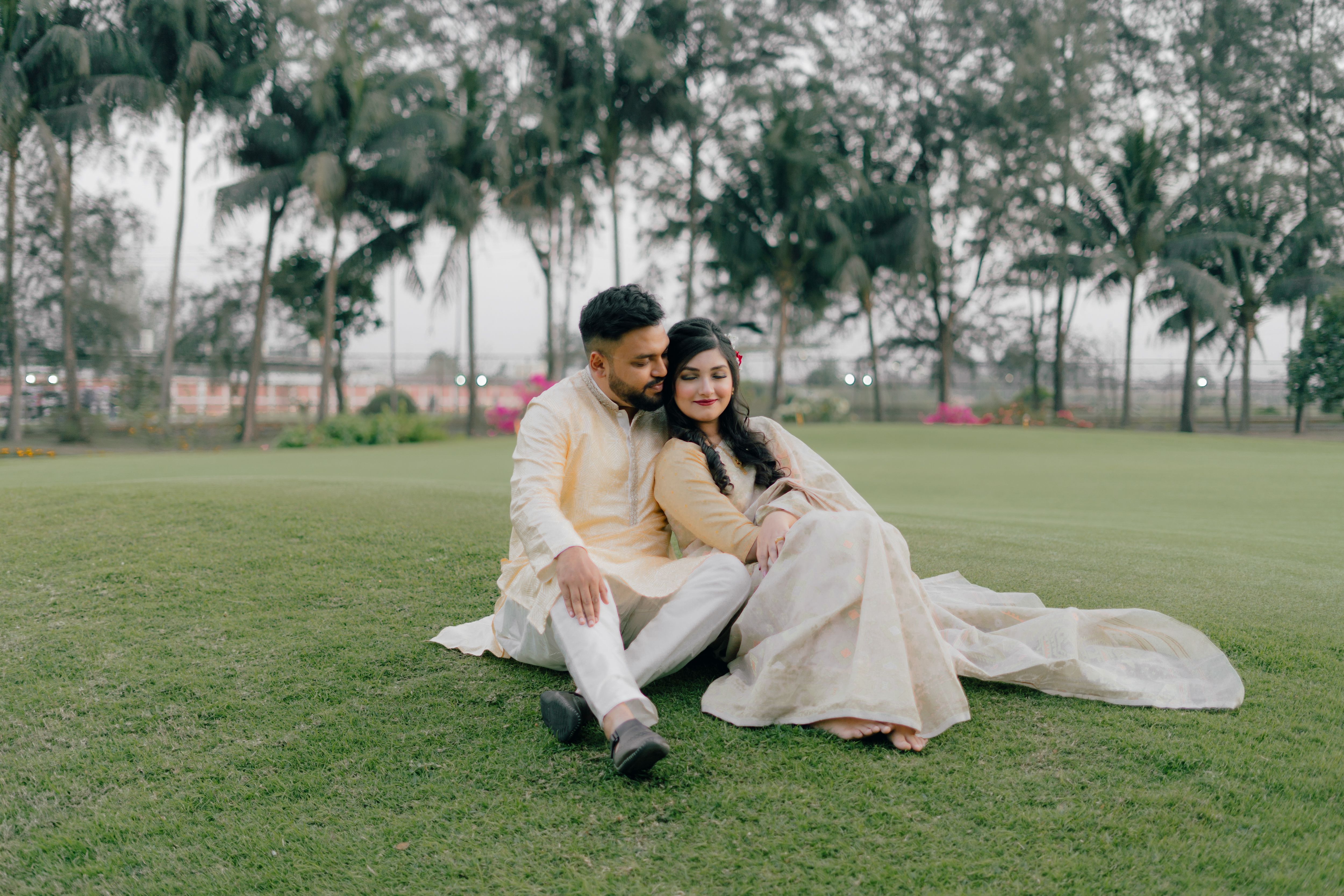 Romantic Couple Posing in Outdoor Pre-Wedding Shoot · Free Stock Photo
