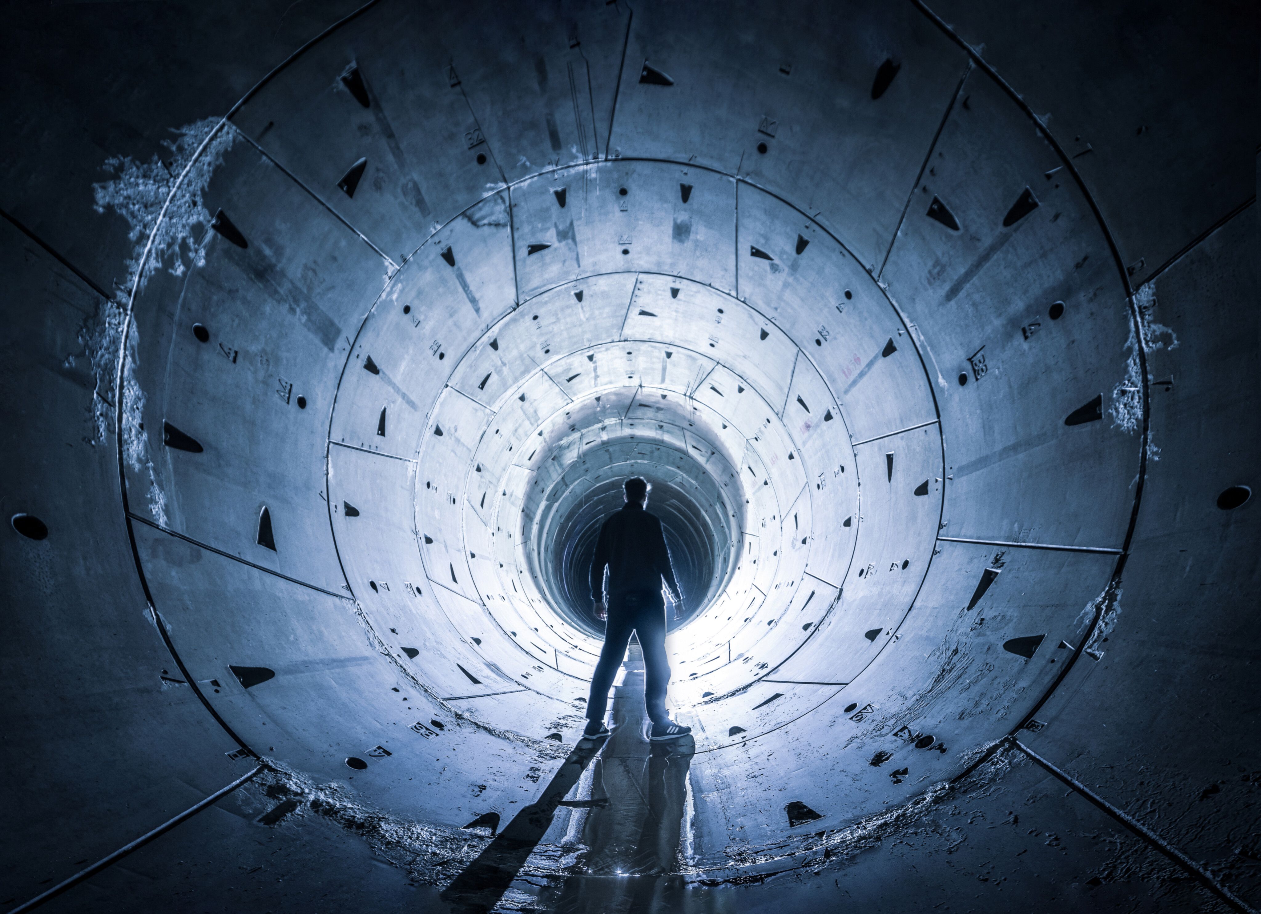 Silhouette of Person in Underground Tunnel · Free Stock Photo