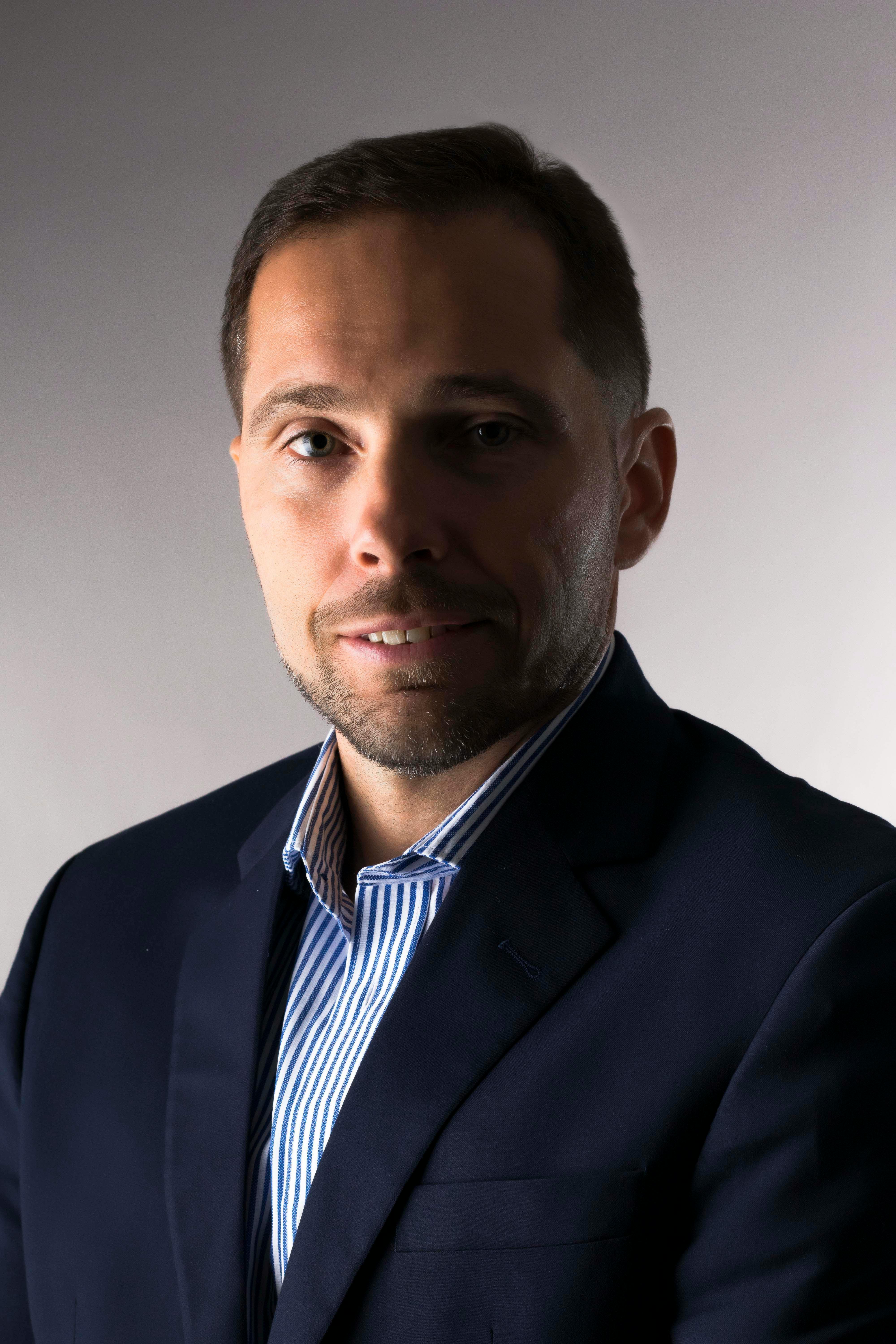 Professional Portrait of Man in Formal Suit · Free Stock Photo