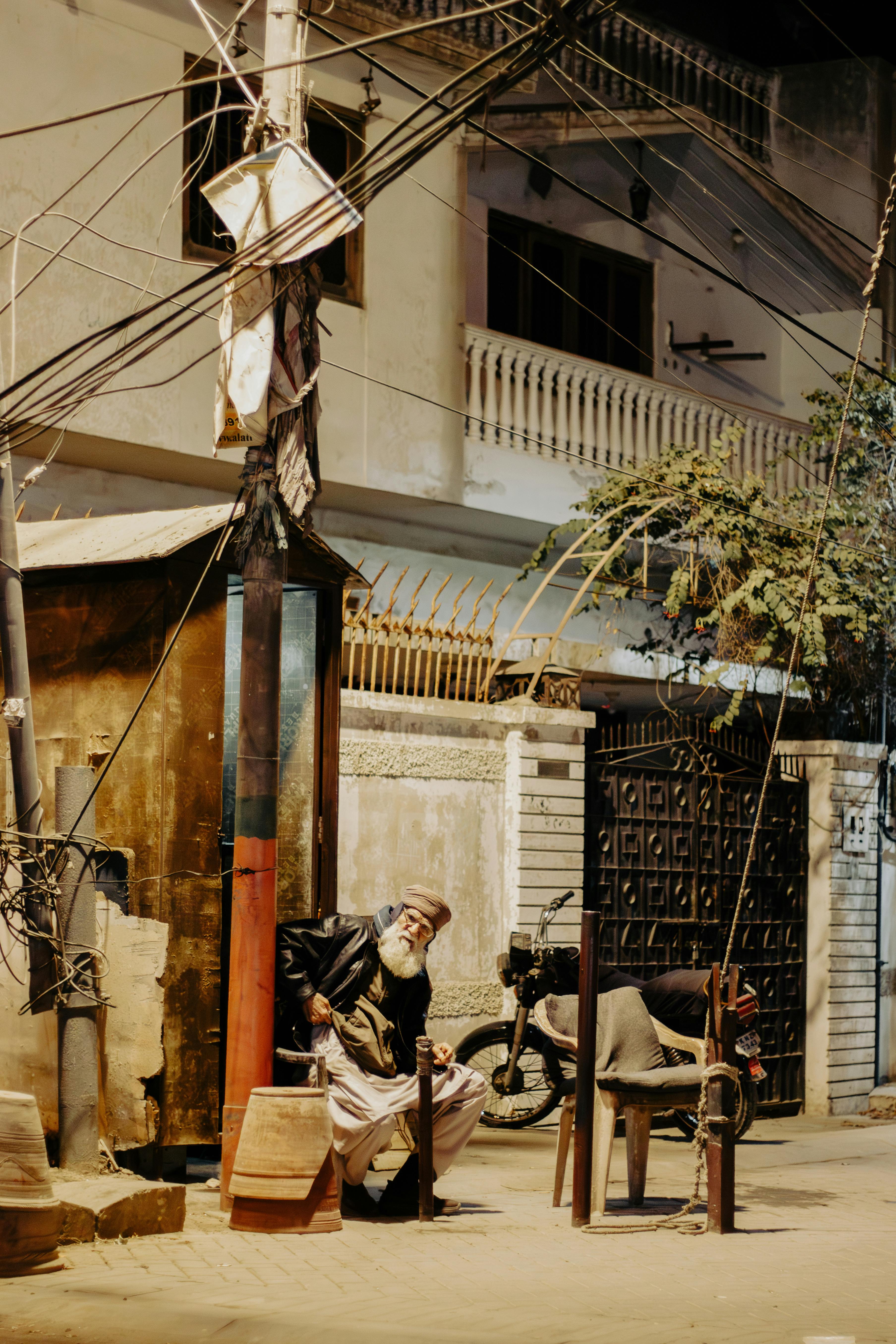 Nighttime Street Scene in Urban Sindh, Pakistan · Free Stock Photo