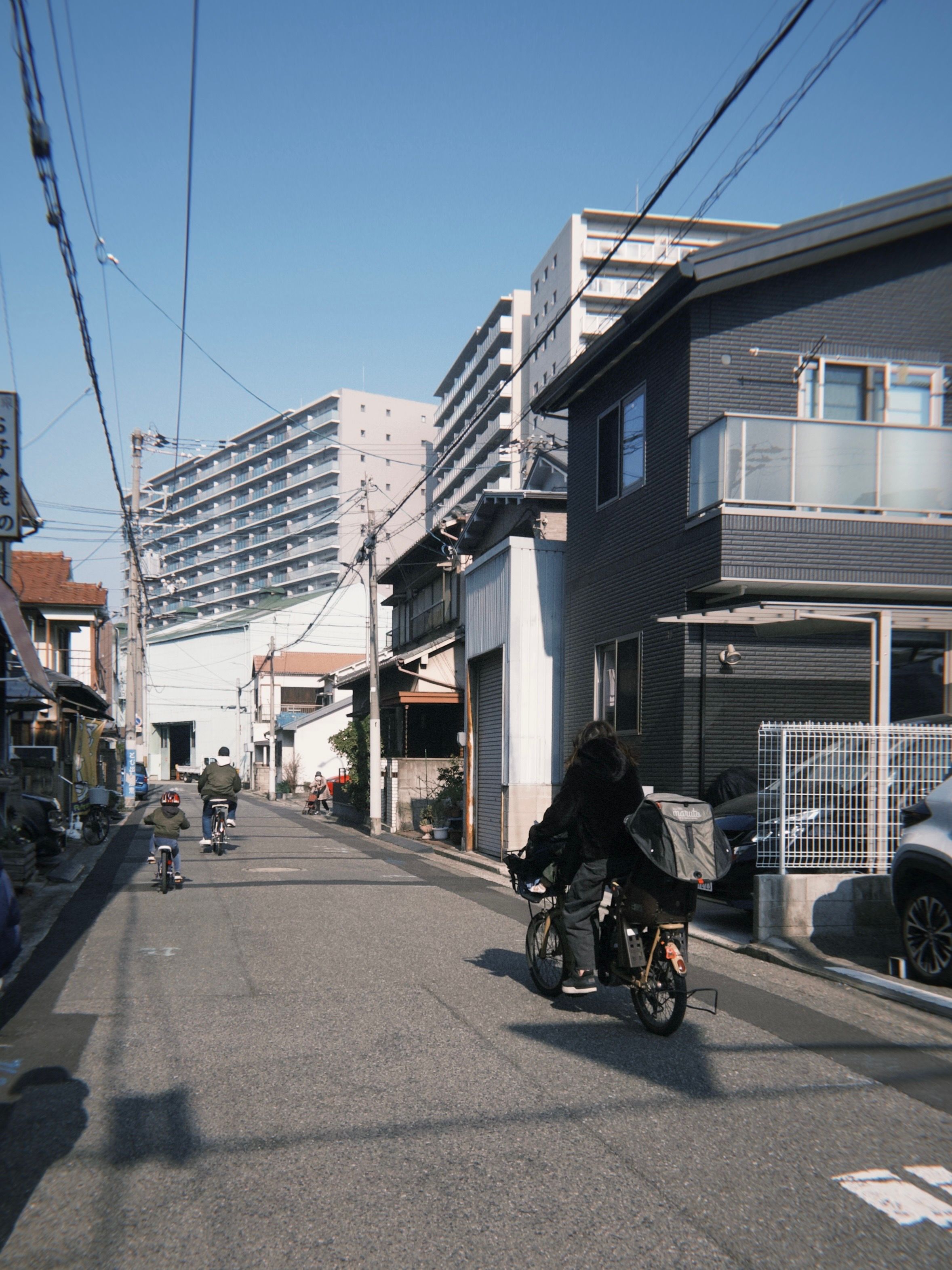 Urban Street Scene with Cyclists in Japan · Free Stock Photo