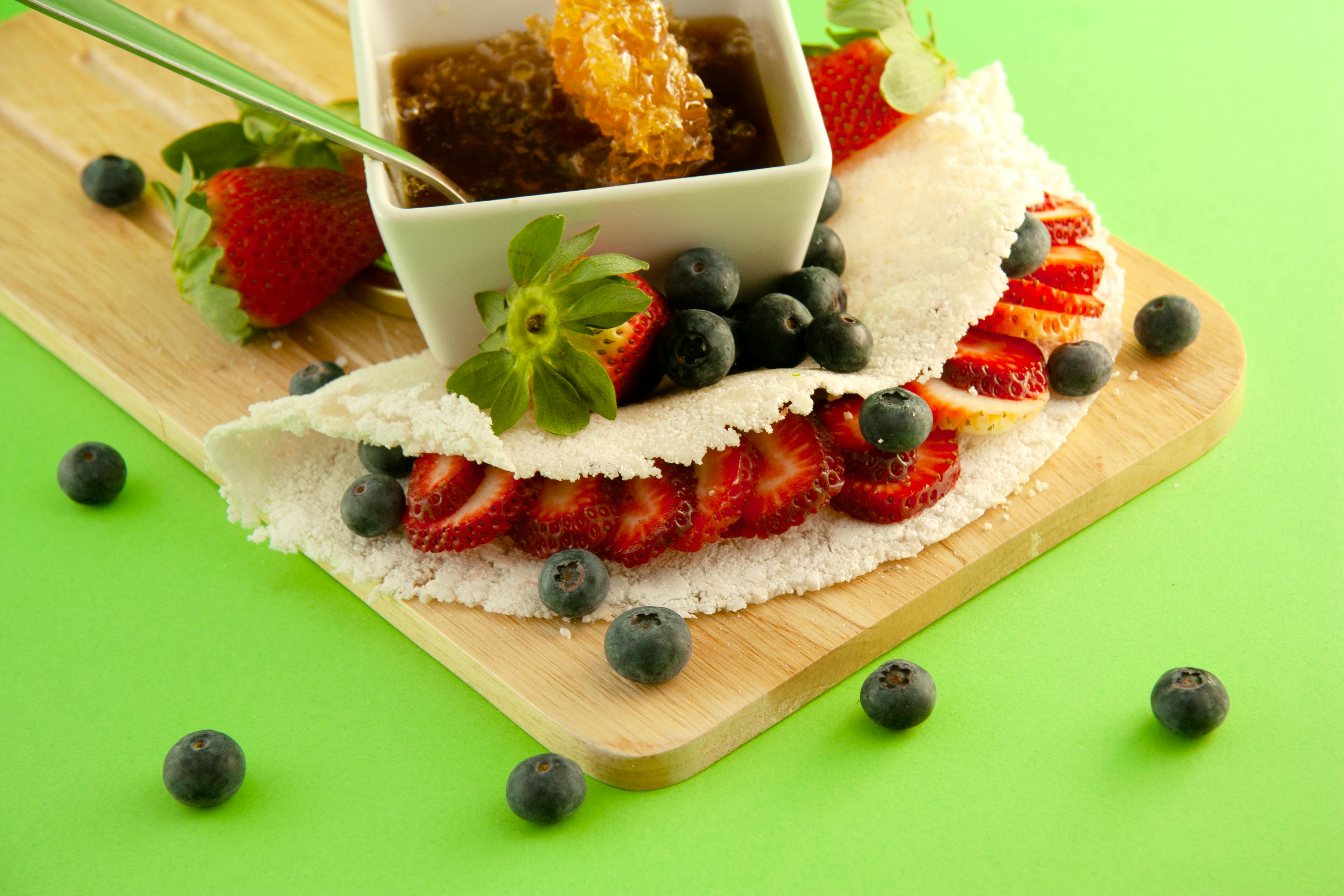 Delicious Tapioca Wrap with Fresh Berries and Honey · Free Stock Photo