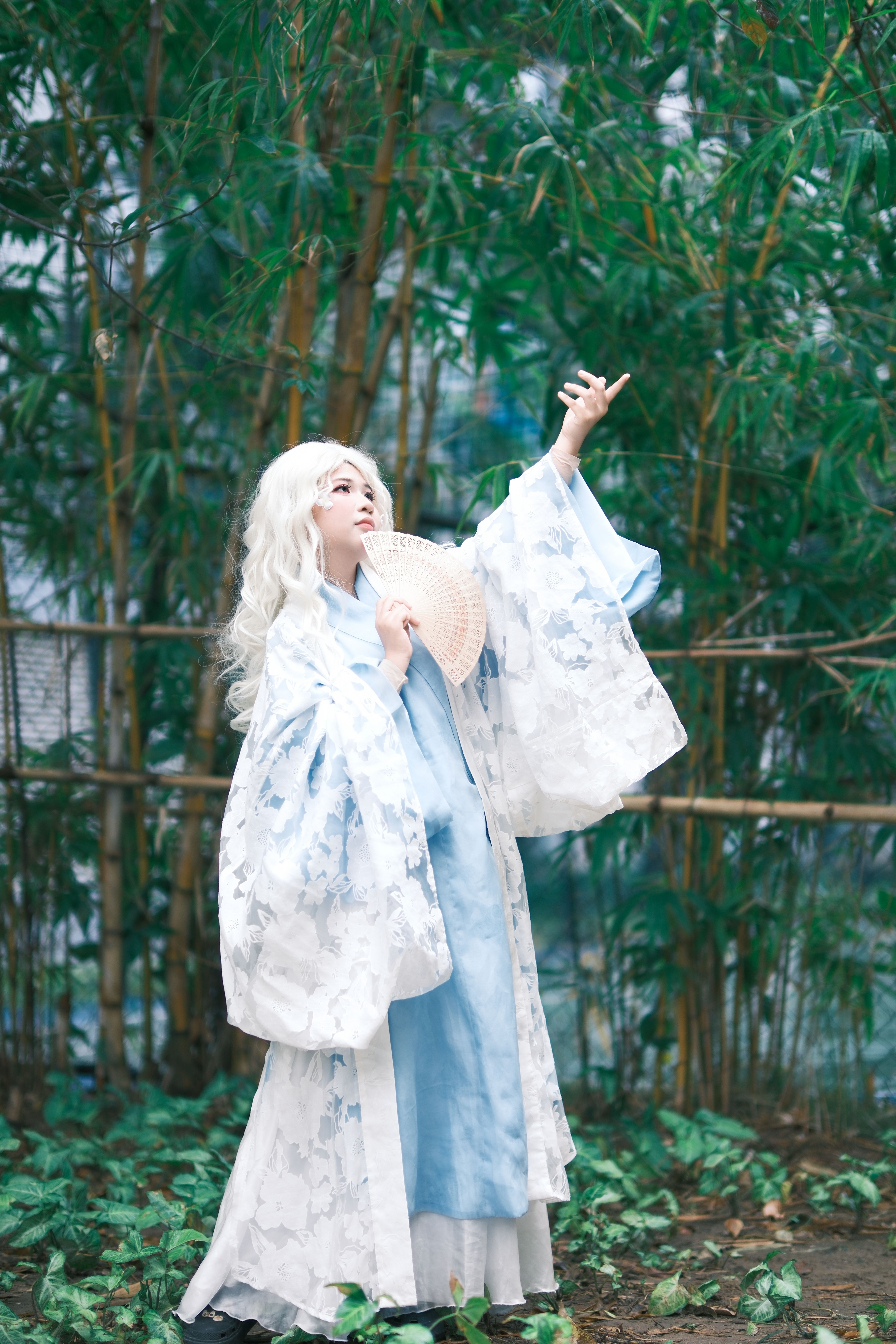 Traditional Japanese Costume Amidst Bamboo Grove · Free Stock Photo