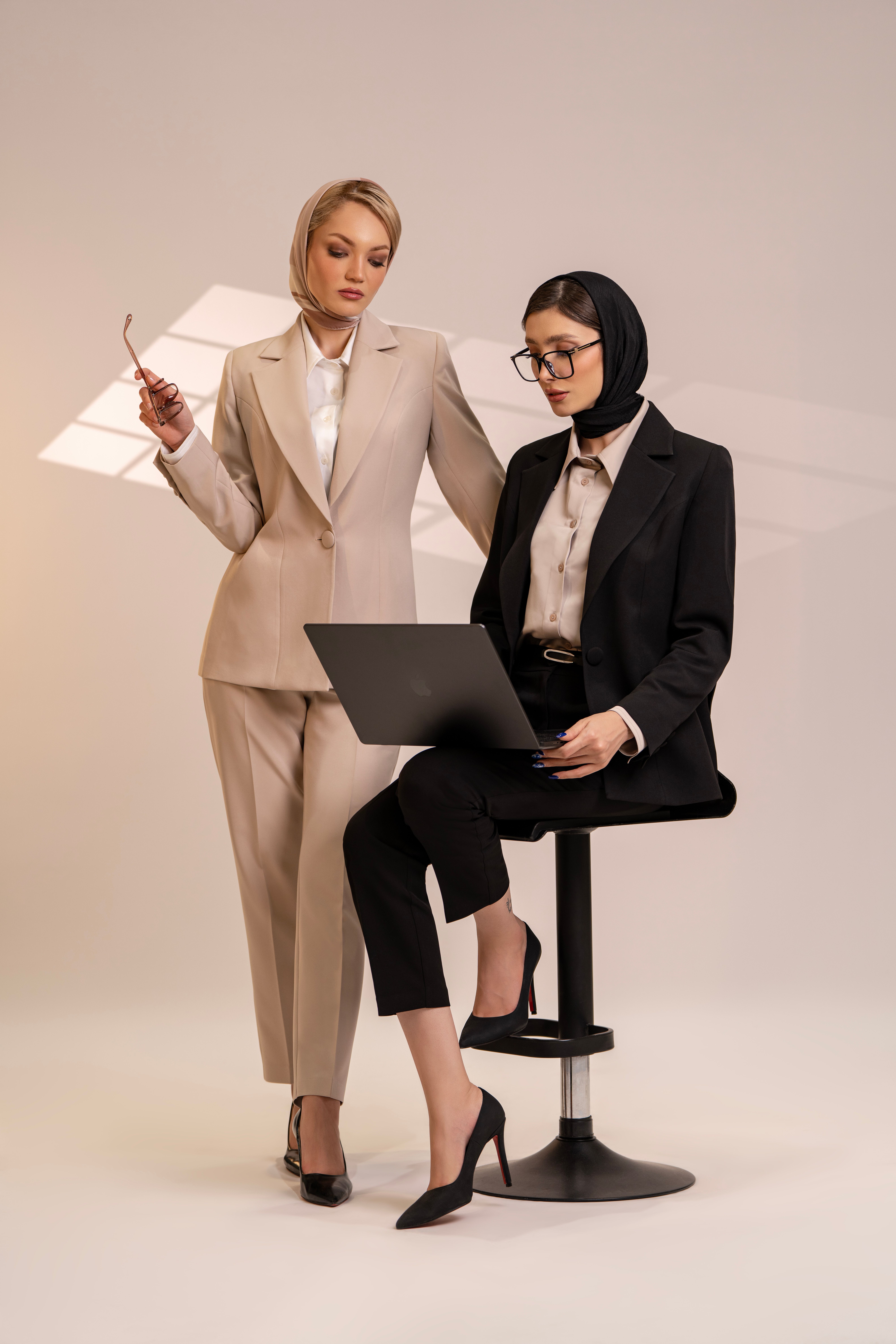Professional Women in Stylish Business Attire · Free Stock Photo