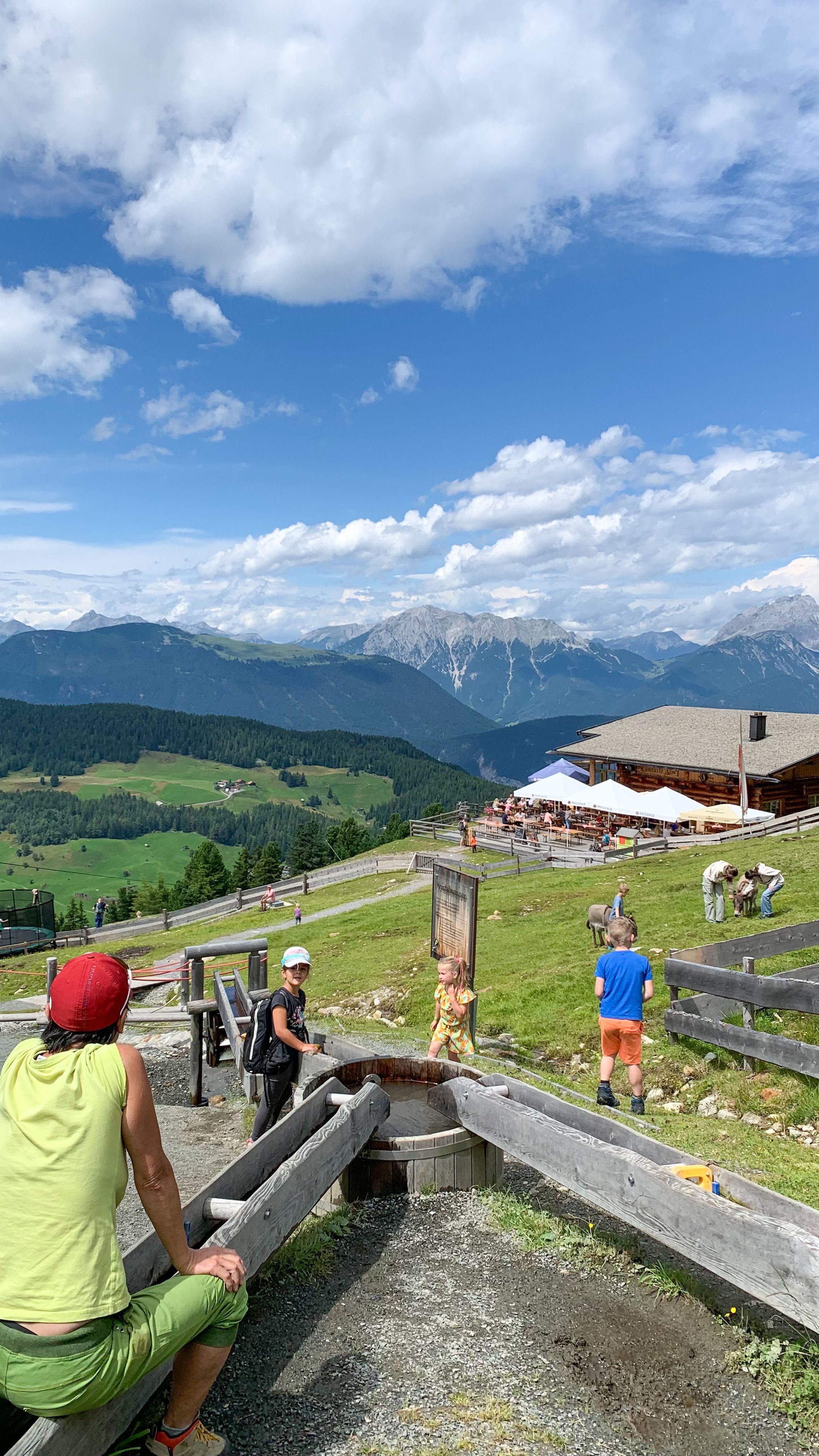 Alpine Outdoor Scene with People Enjoying Nature · Free Stock Photo