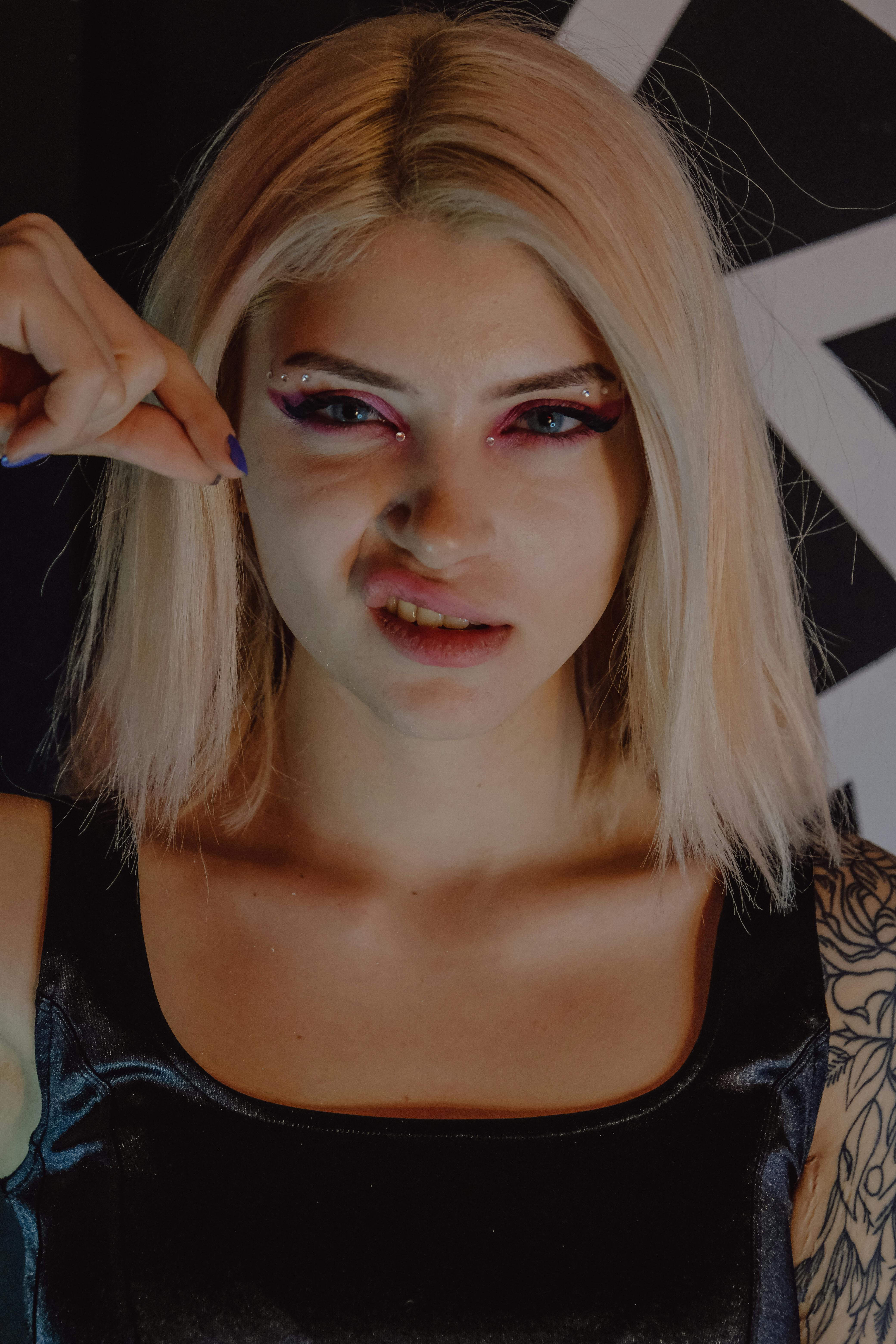 Edgy Portrait of Woman with Stylish Makeup · Free Stock Photo