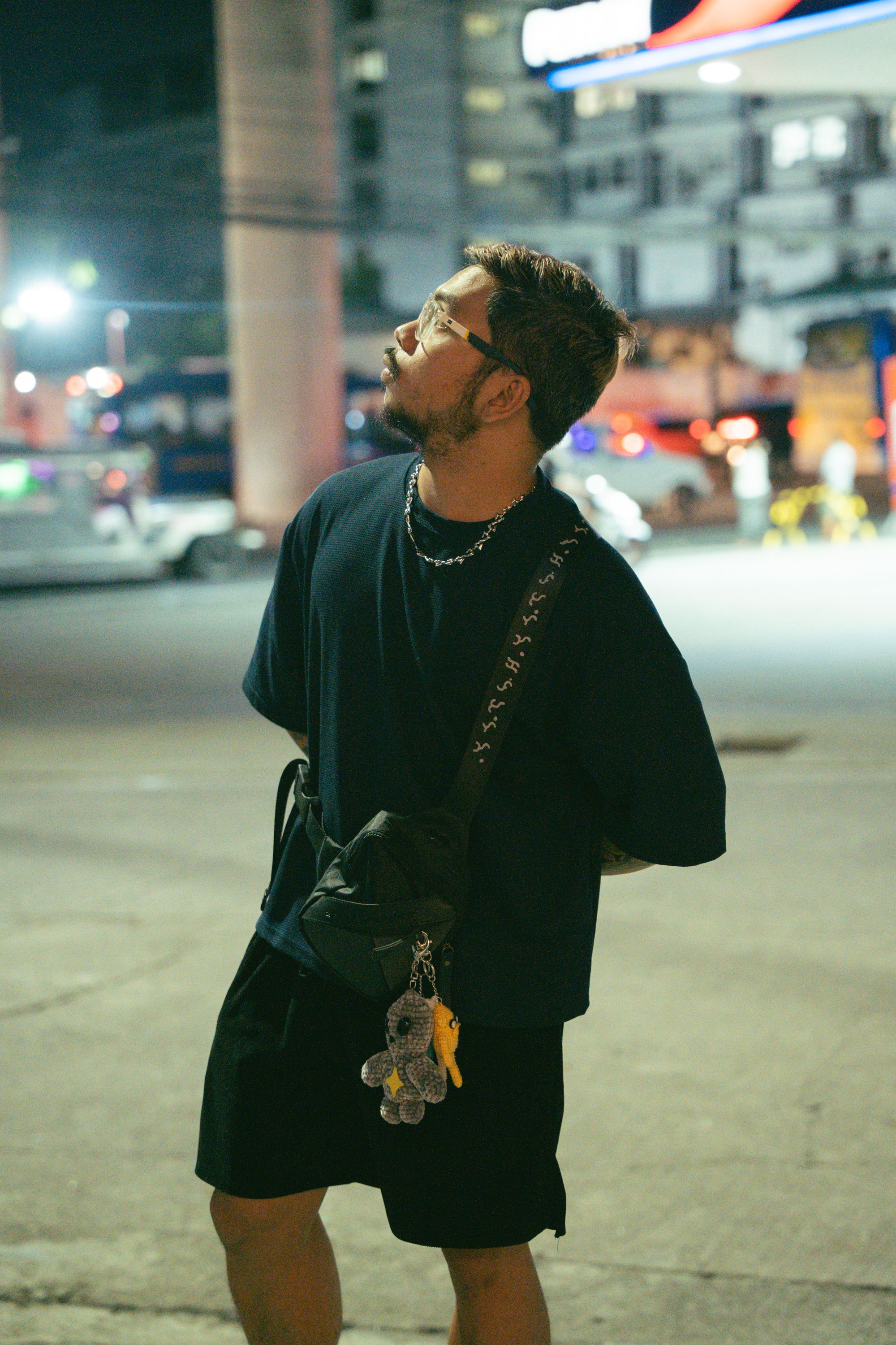 Man Exploring Vibrant City Streets at Night · Free Stock Photo