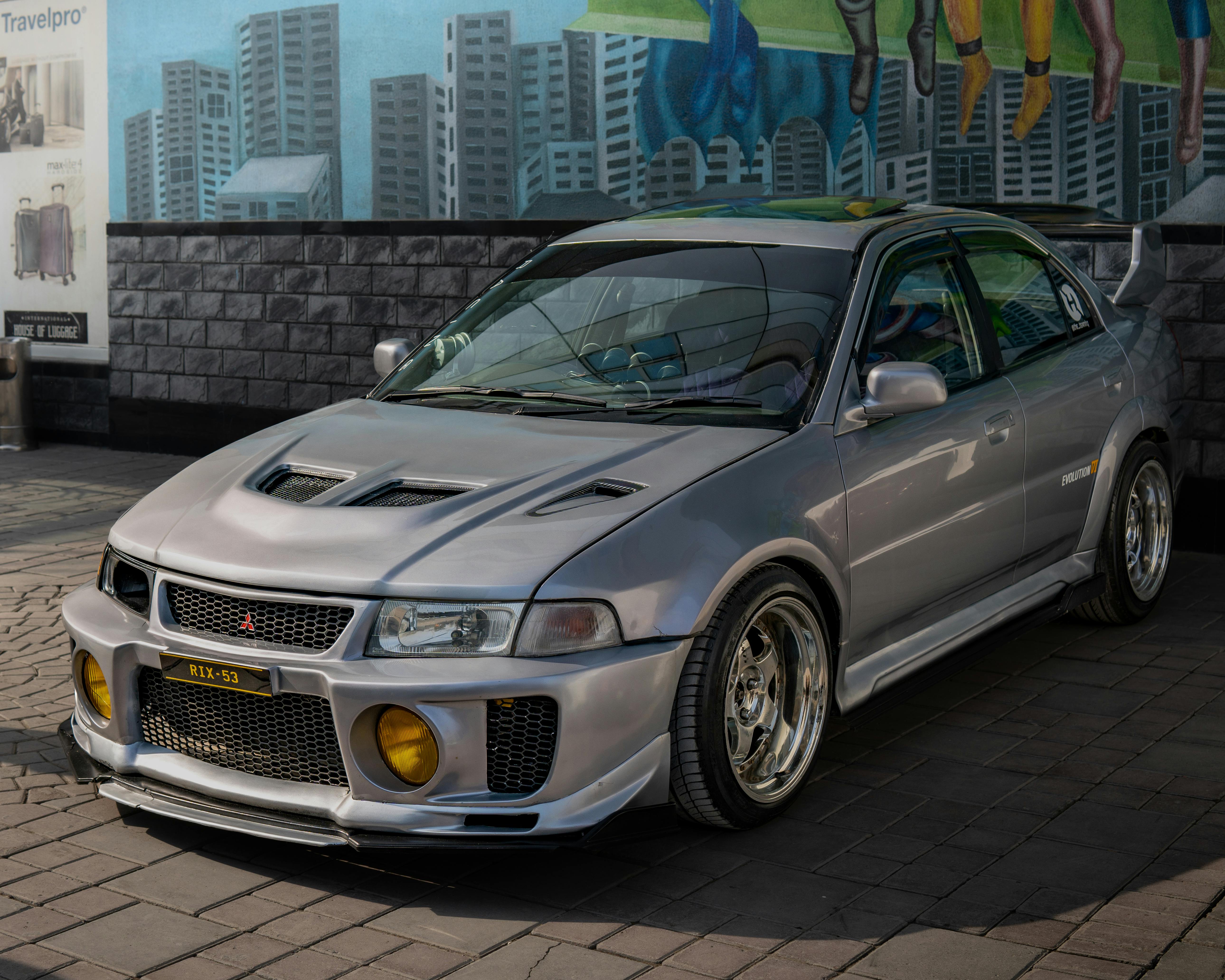 Silver Sports Car with Custom Modifications · Free Stock Photo