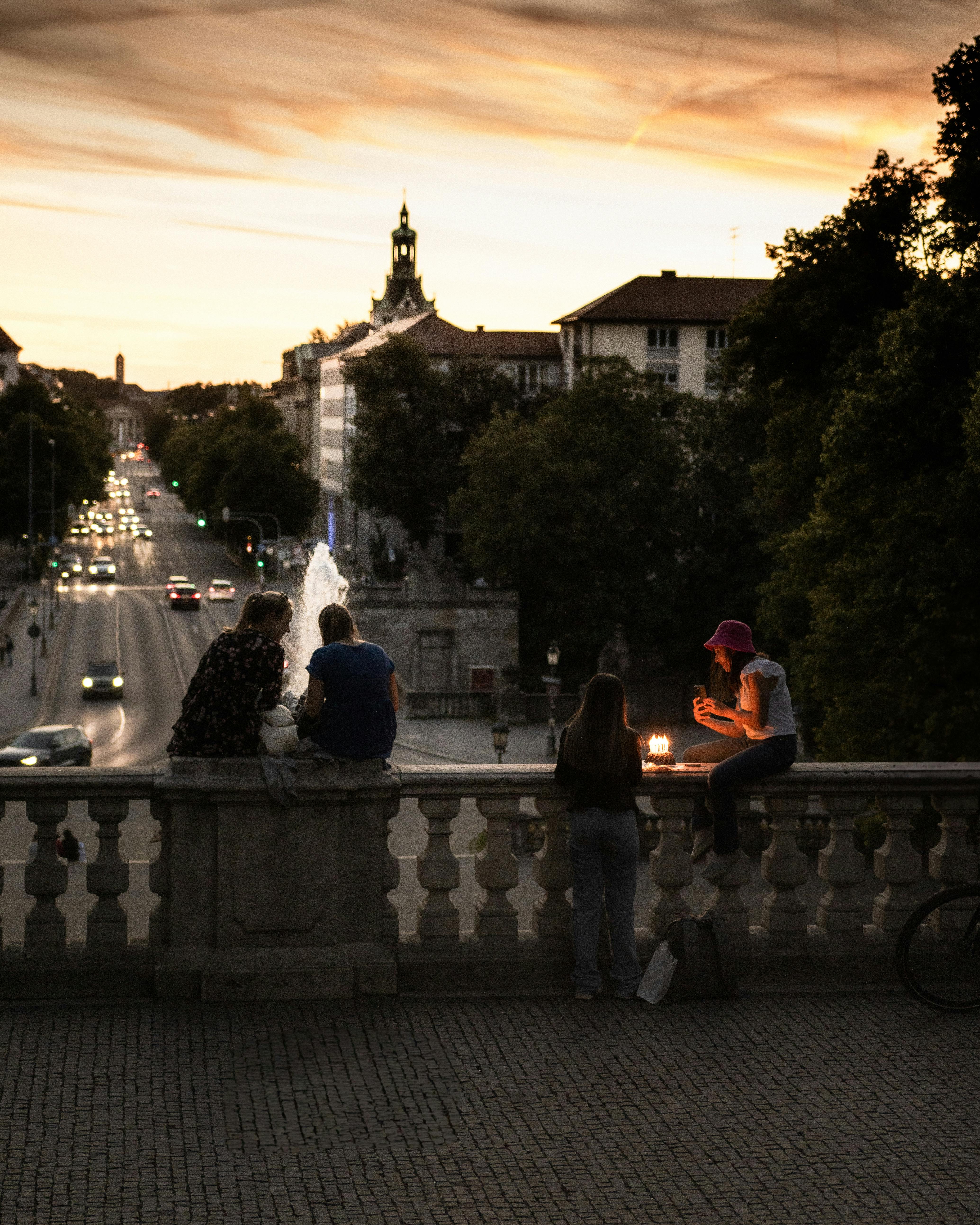 Sunset Gathering on Munich Bridge · Free Stock Photo