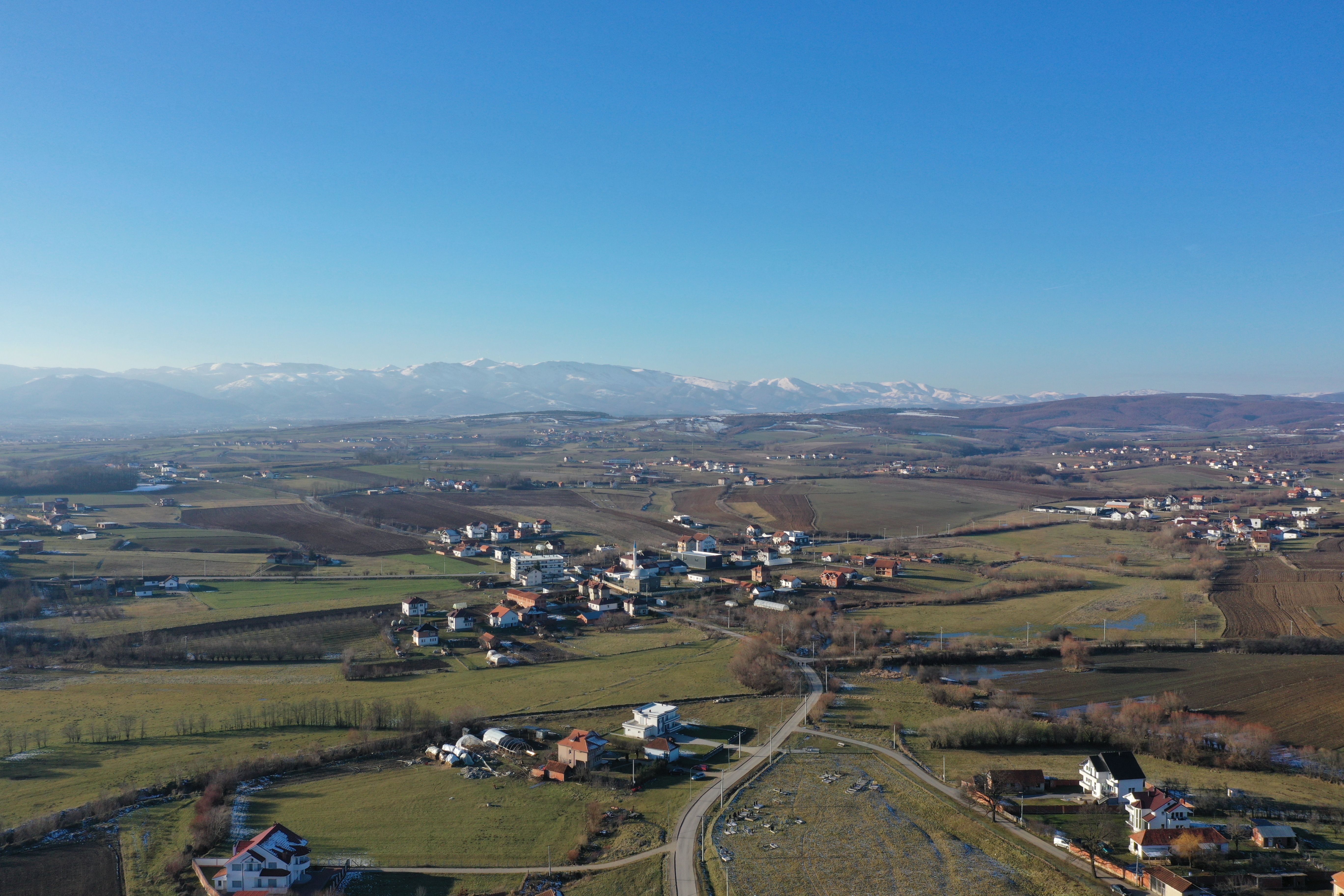 Aerial view of rural landscape with scattered houses · Free Stock Photo