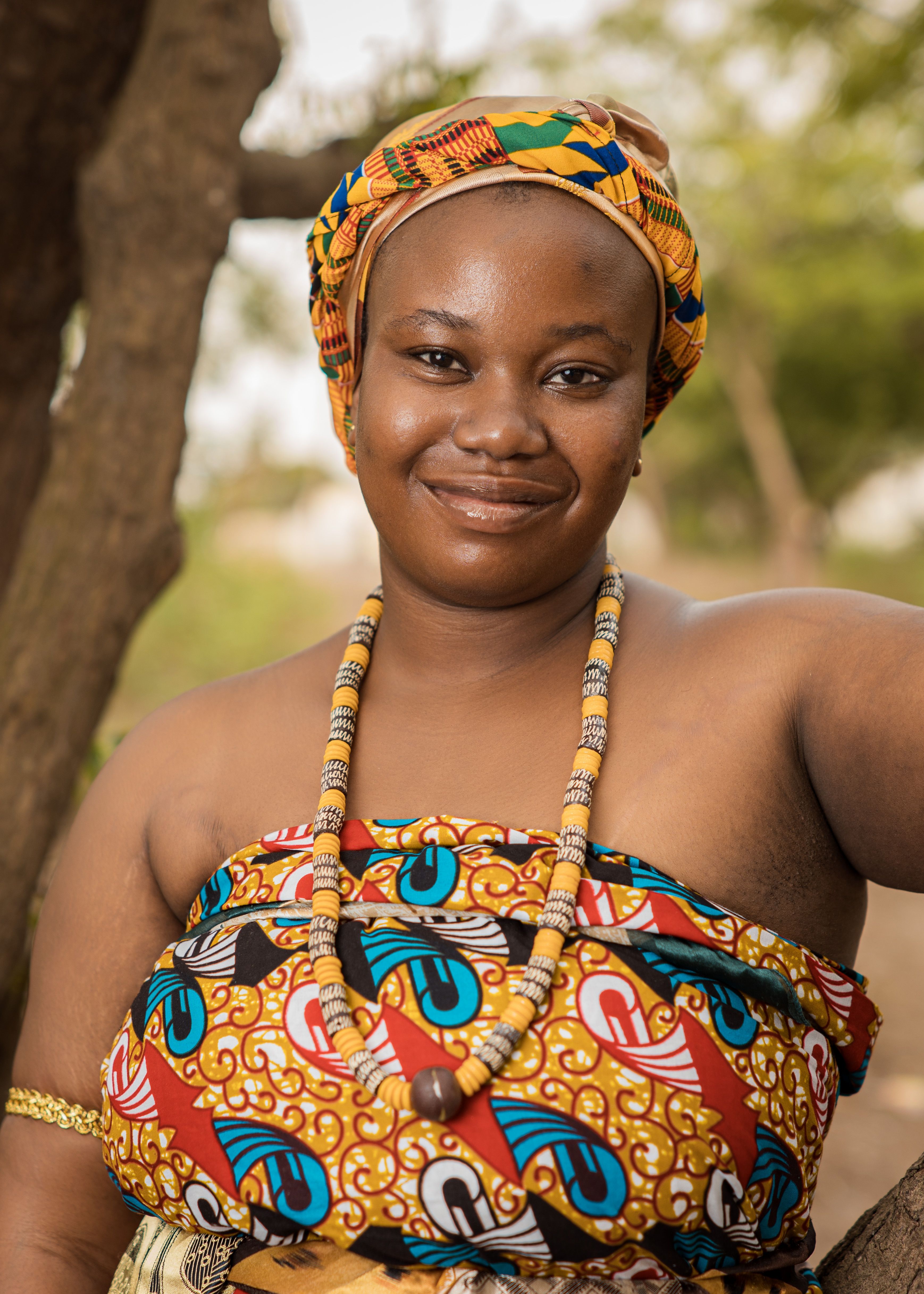 African Woman in Traditional Colorful Attire · Free Stock Photo