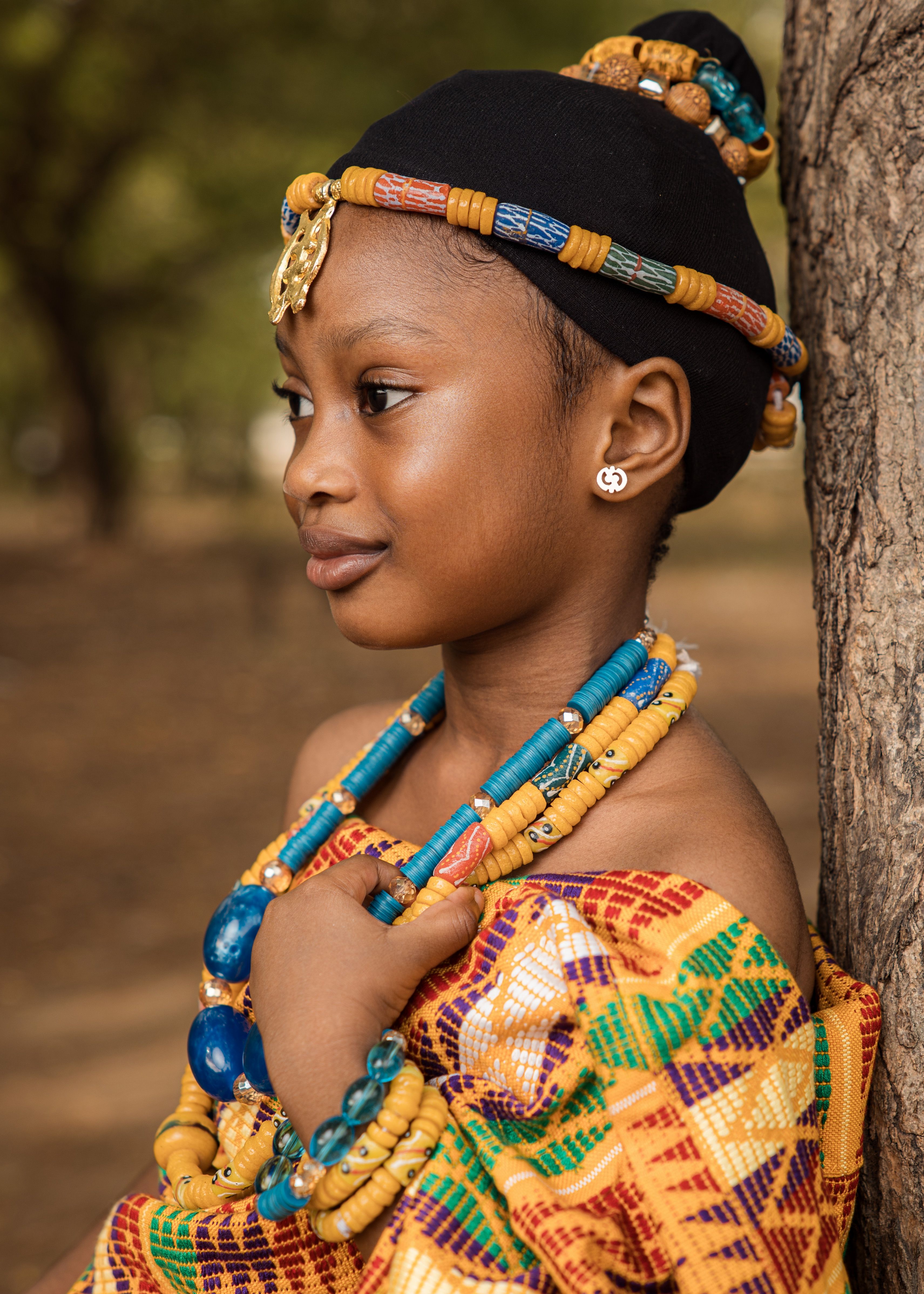 Young Girl in Traditional African Attire Outdoors · Free Stock Photo