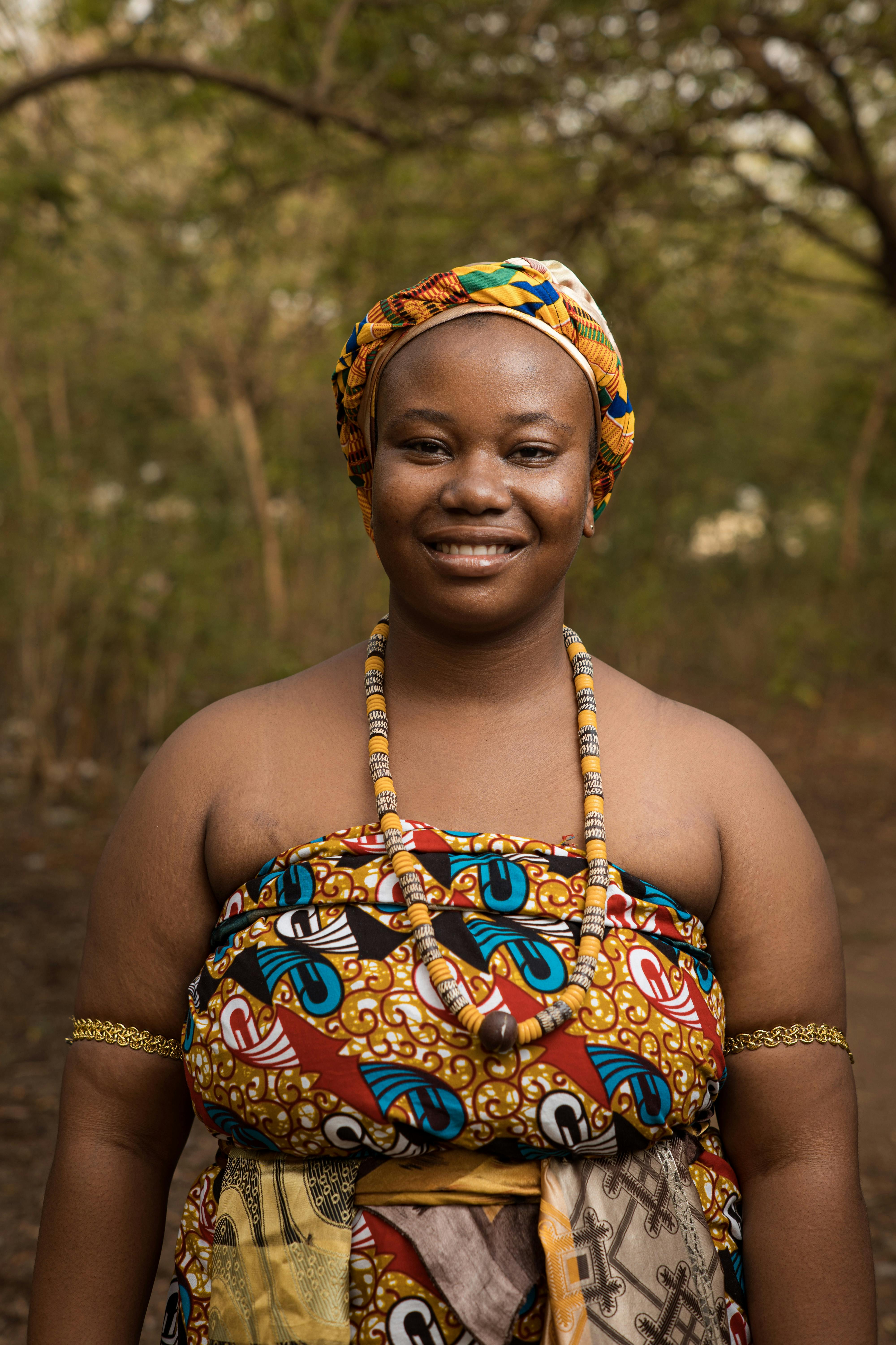 African Woman in Traditional Attire Outdoors · Free Stock Photo