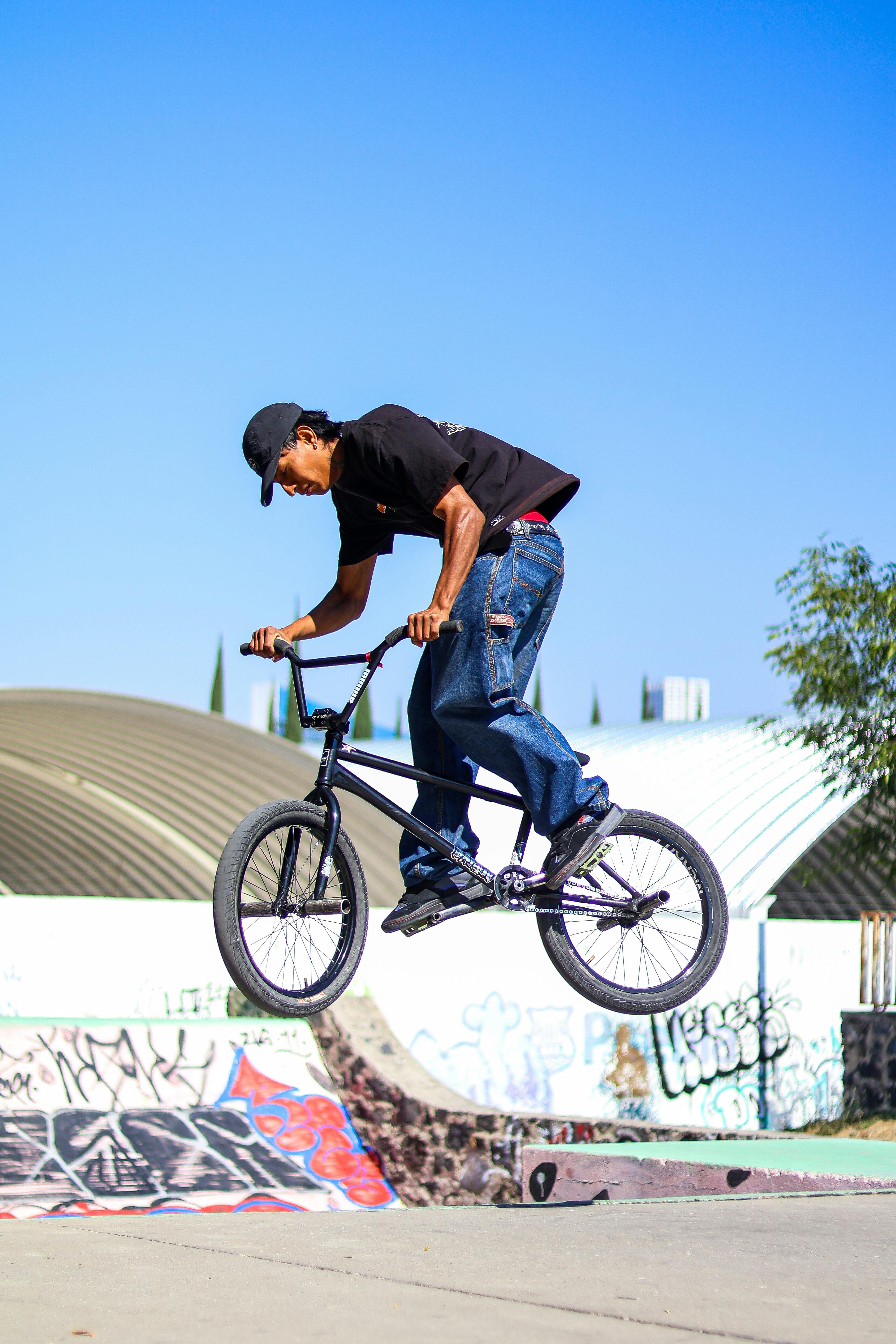 Dynamic BMX Stunt at Urban Skatepark · Free Stock Photo
