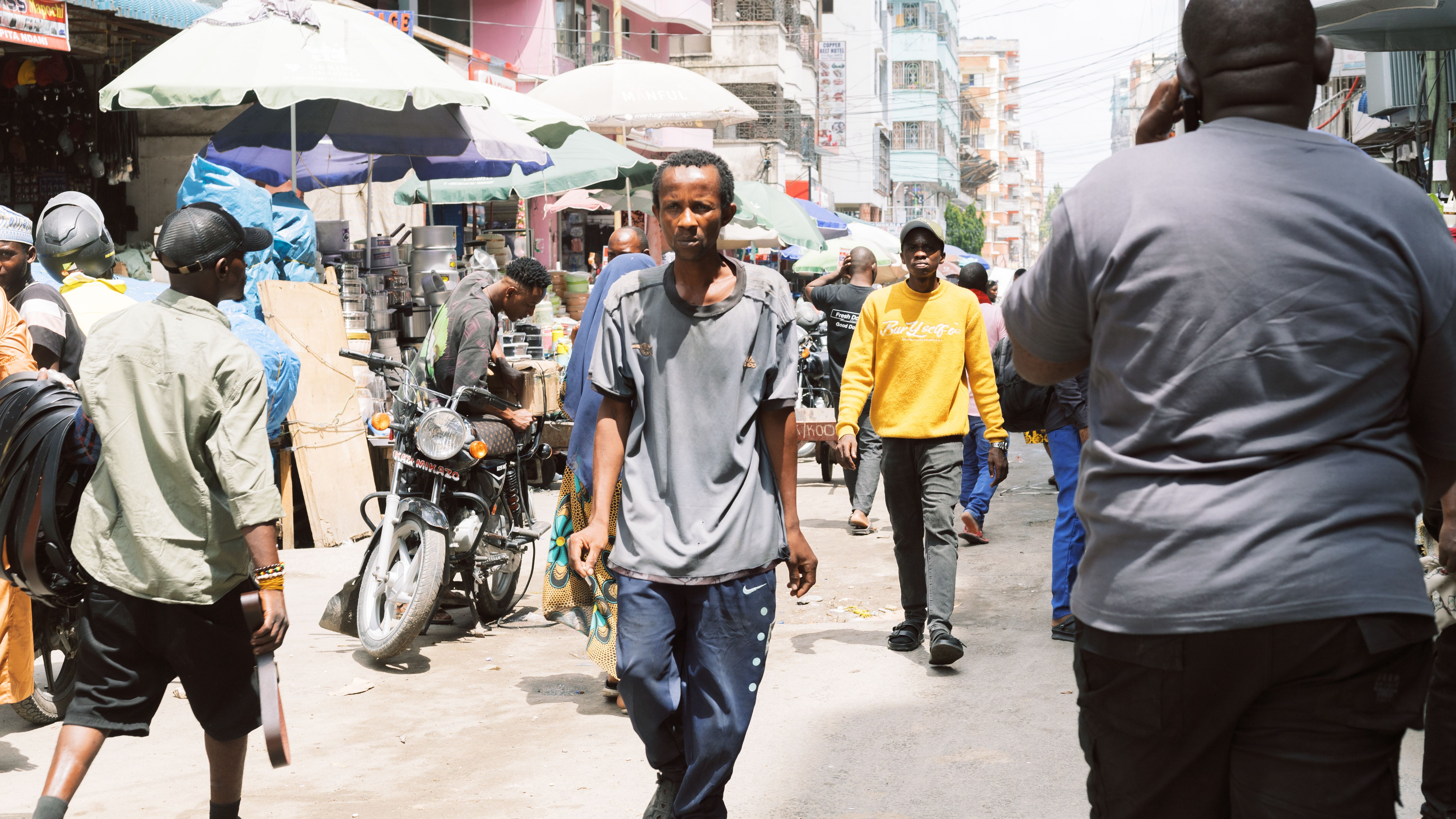 Busy Urban Street Scene with People Walking · Free Stock Photo