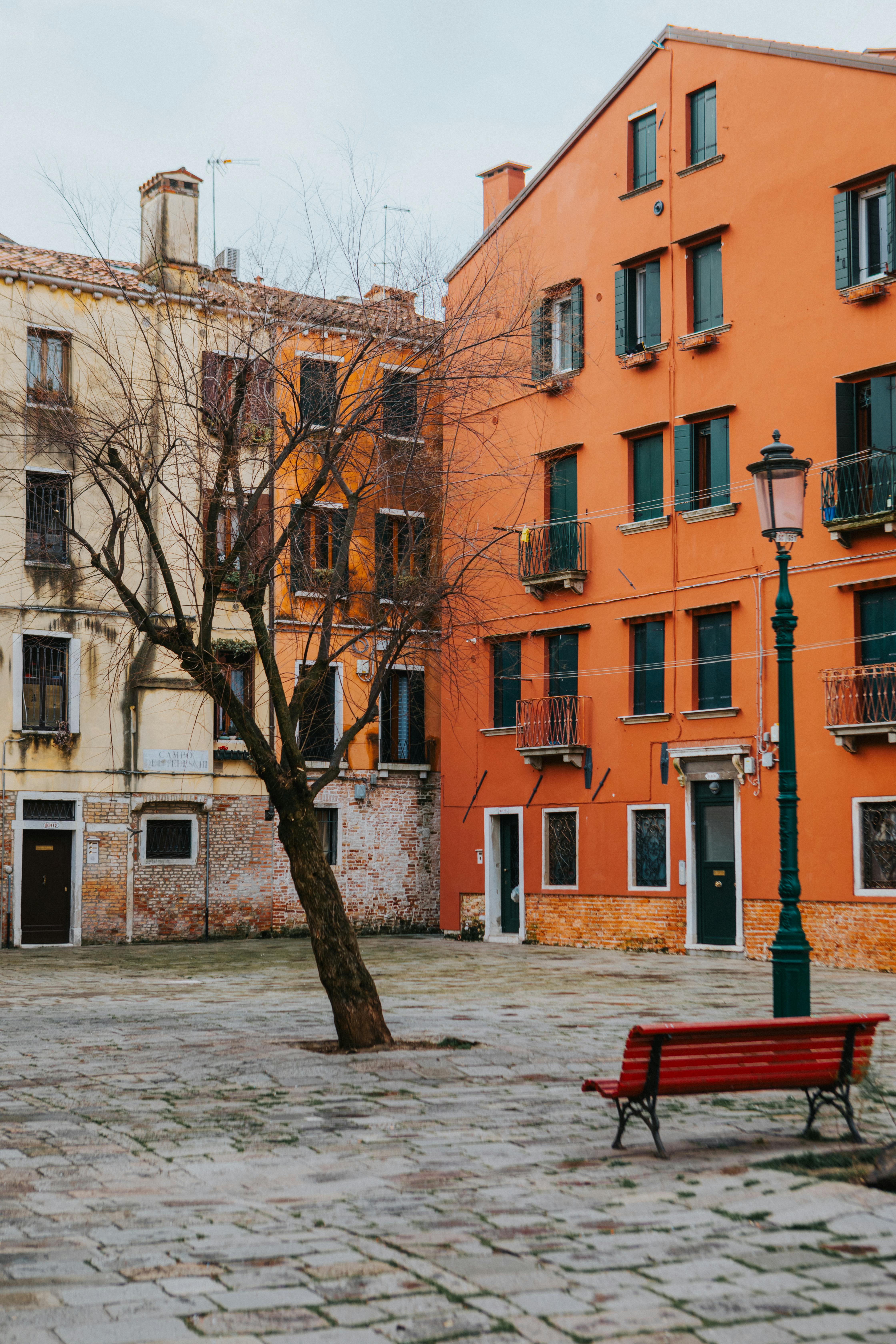 Charming European Courtyard with Colorful Buildings · Free Stock Photo