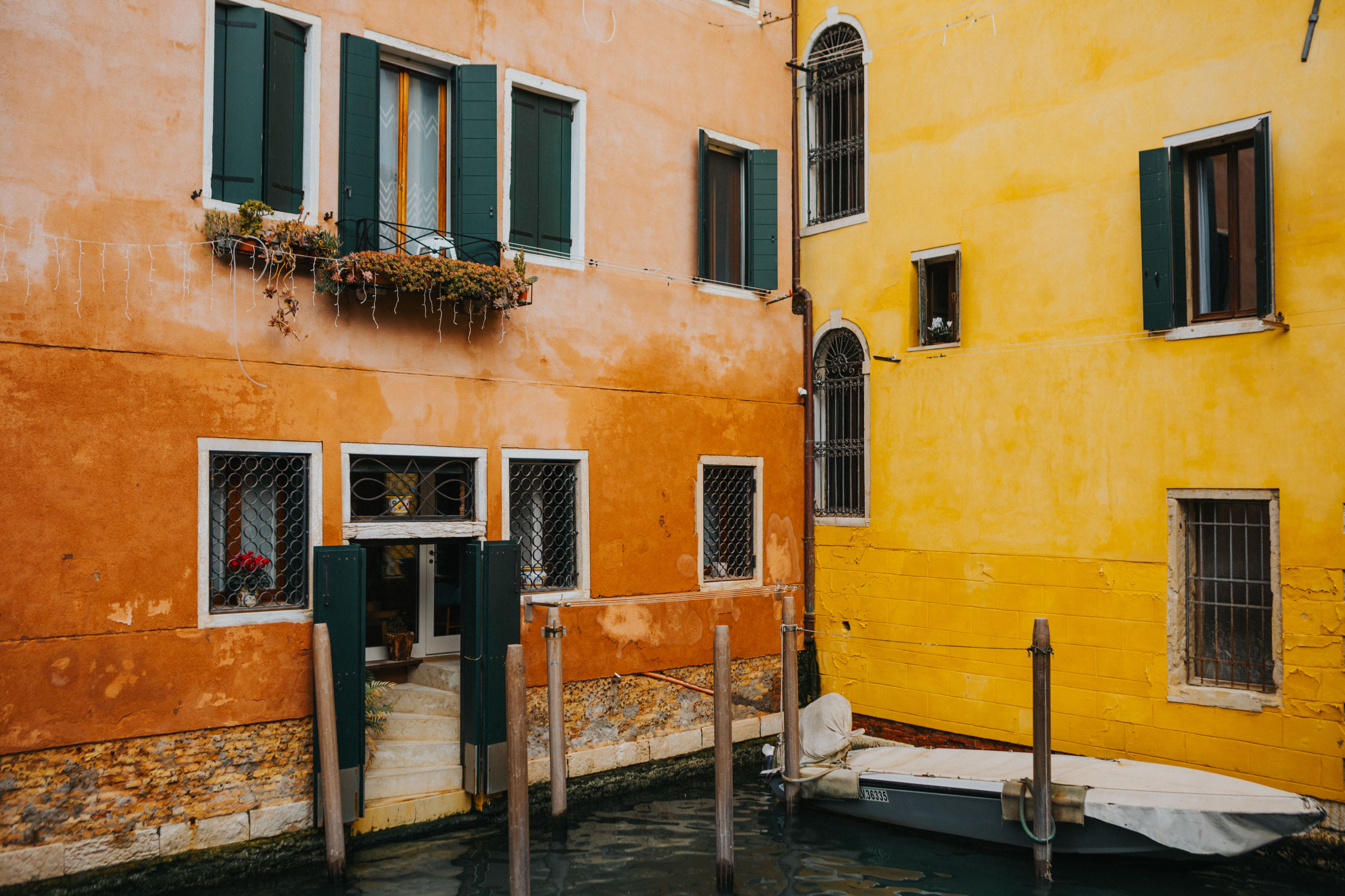 Colorful Venetian architecture by the canal · Free Stock Photo
