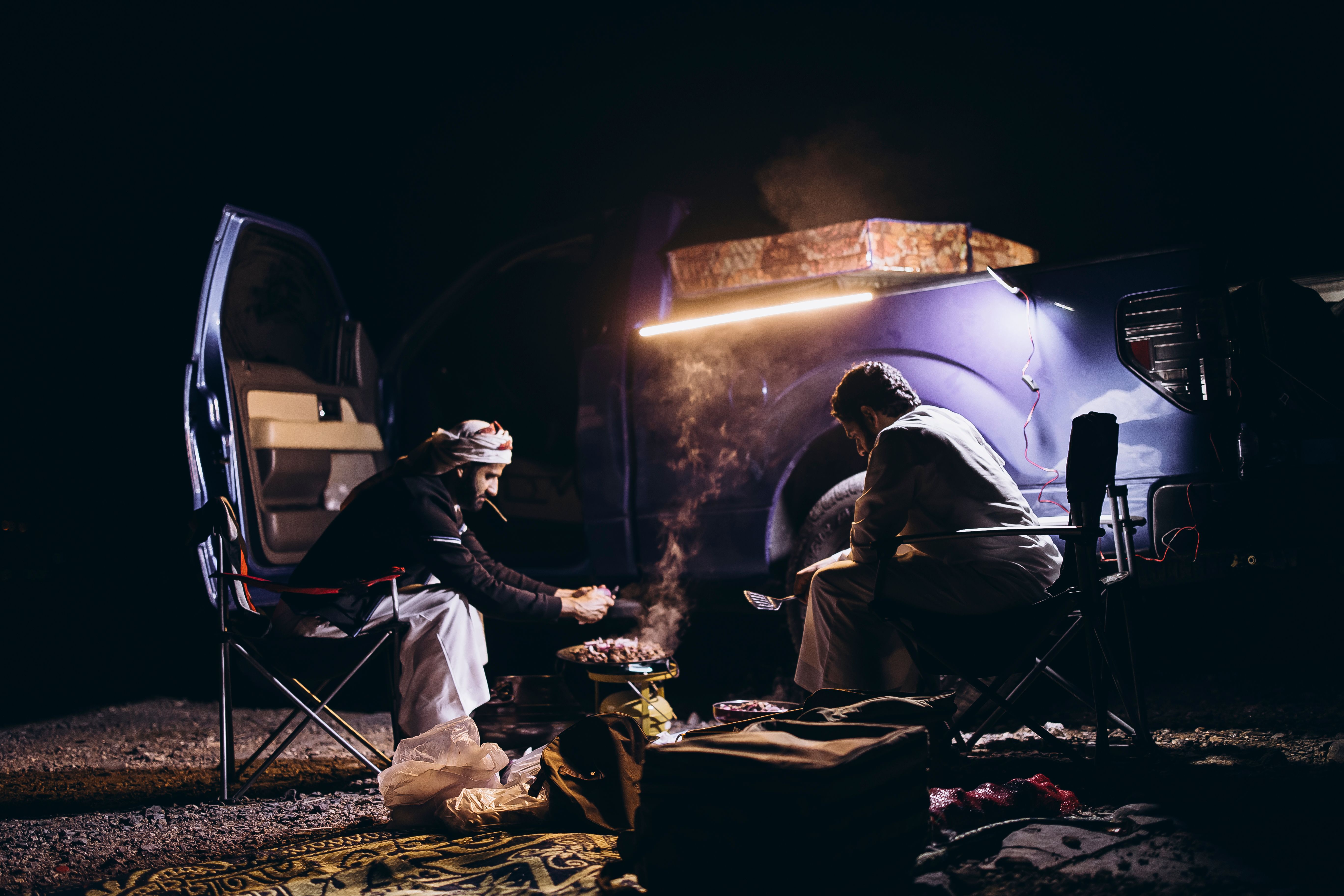 Nighttime Camping and Cooking in Oman's Wilderness · Free Stock Photo