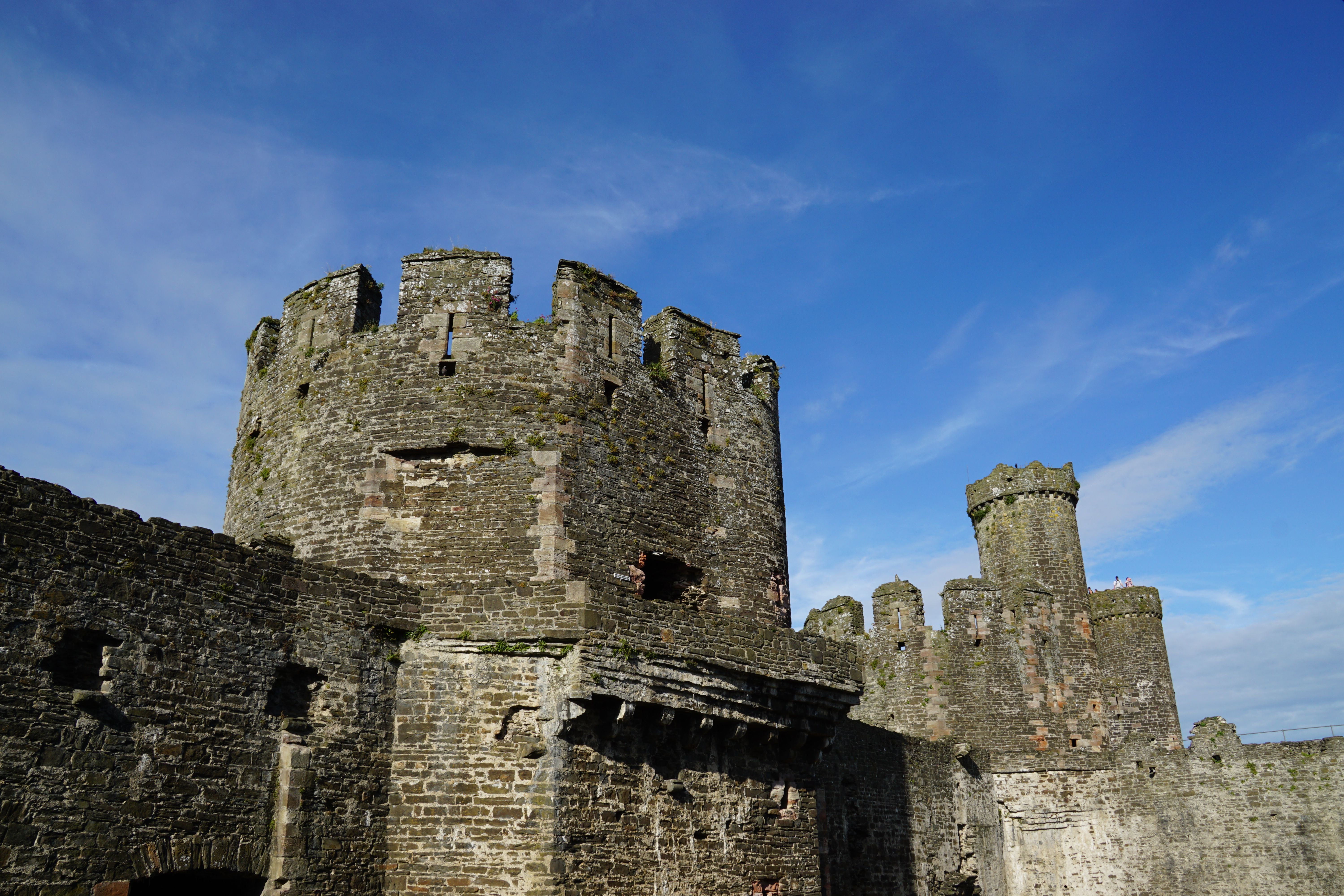 Medieval Castle Walls Against Clear Blue Sky · Free Stock Photo
