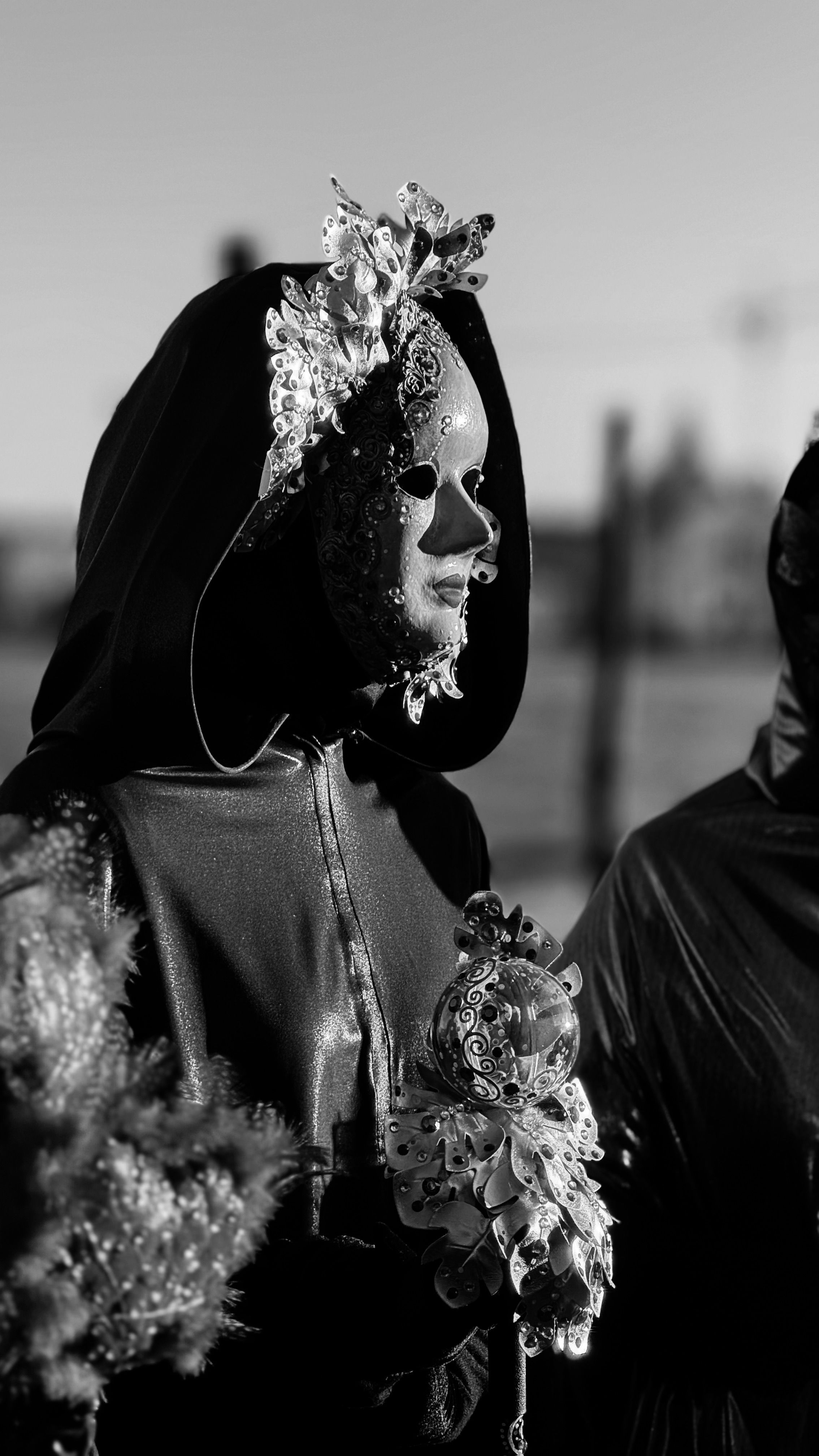 Venetian Masked Figure in Black and White · Free Stock Photo