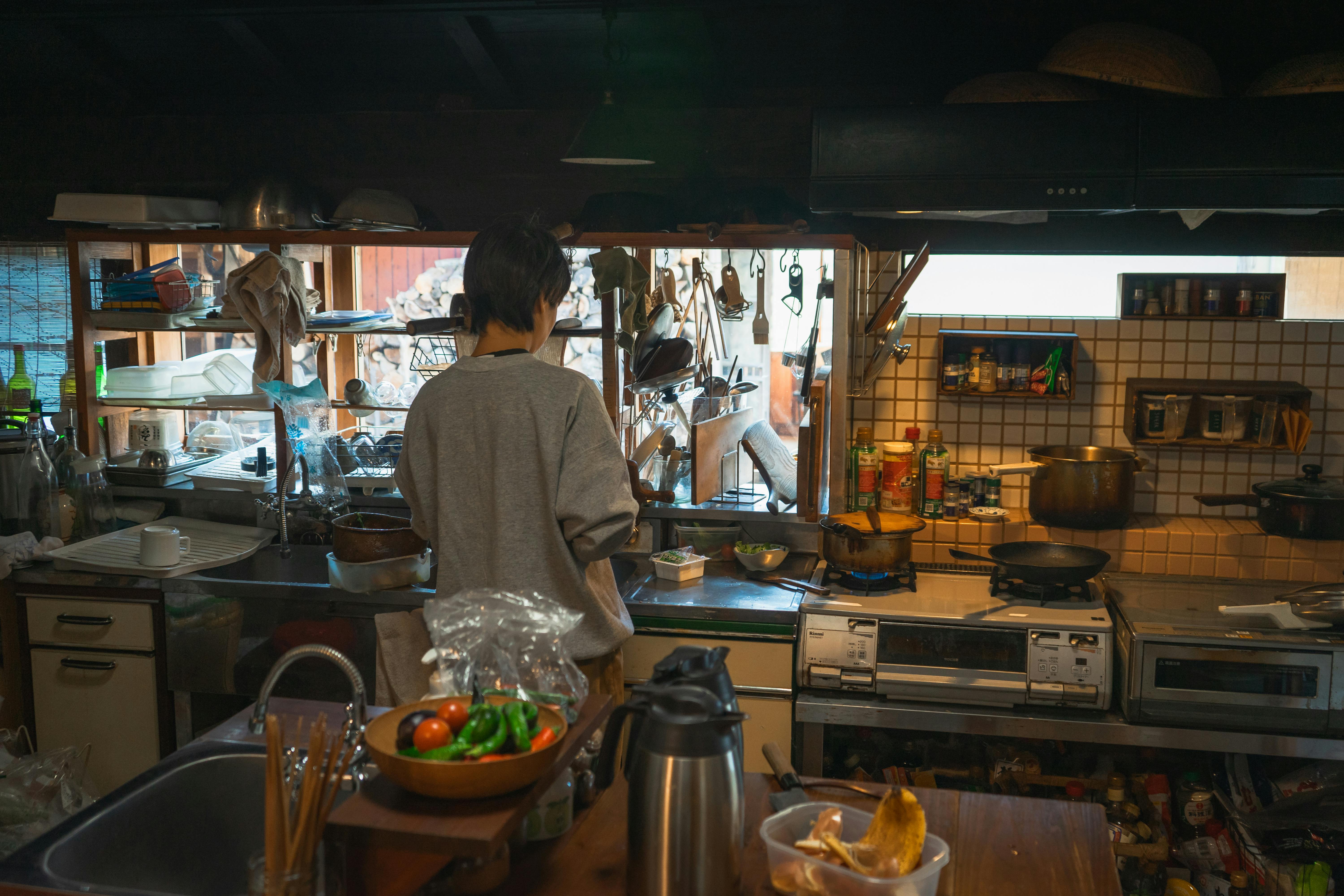Traditional Japanese Kitchen with Person Cooking · Free Stock Photo