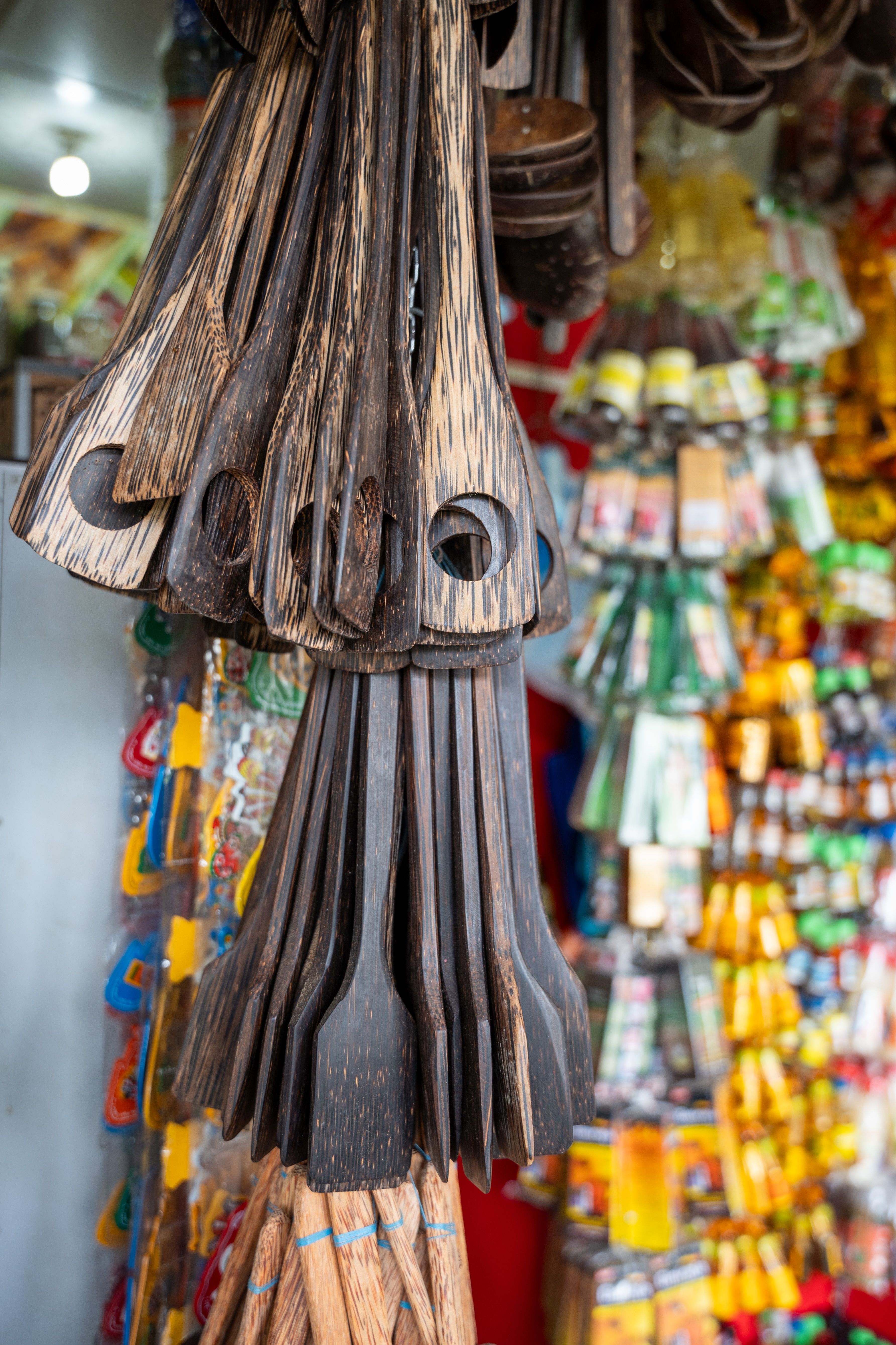 Handcrafted Wooden Utensils in Colorful Market · Free Stock Photo