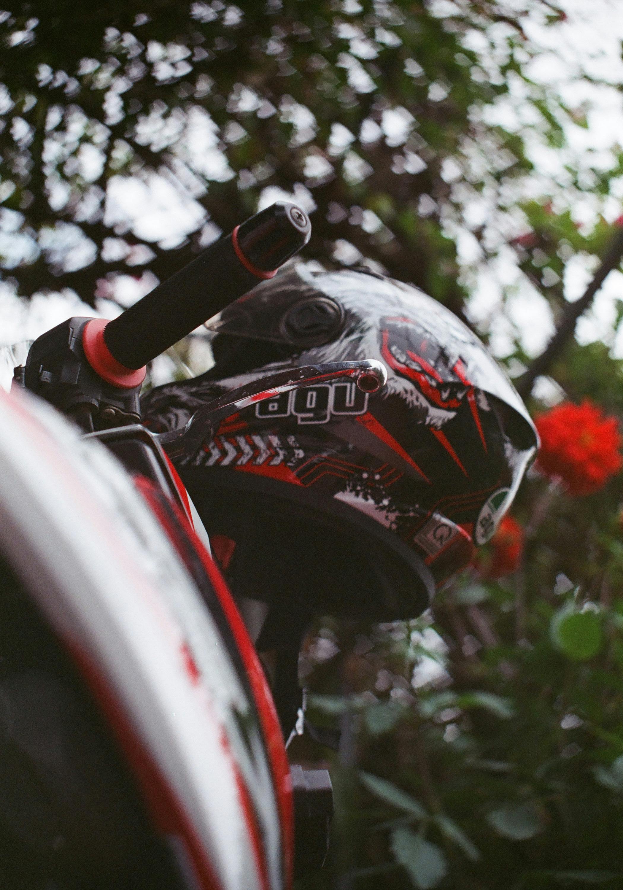 Close-up of Vibrant Motorcycle with Helmet · Free Stock Photo
