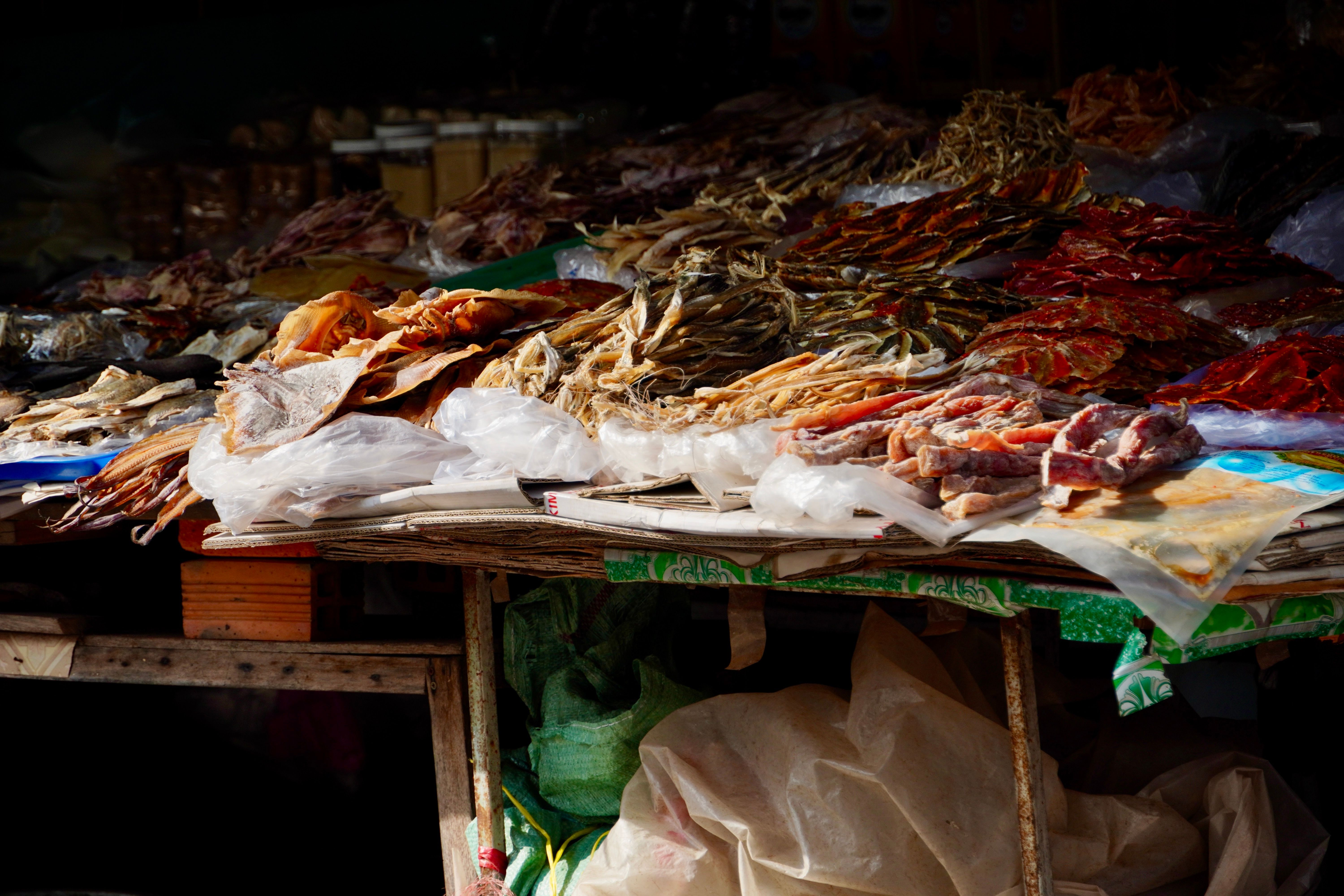 Variety of Dried Foods Displayed at Market · Free Stock Photo