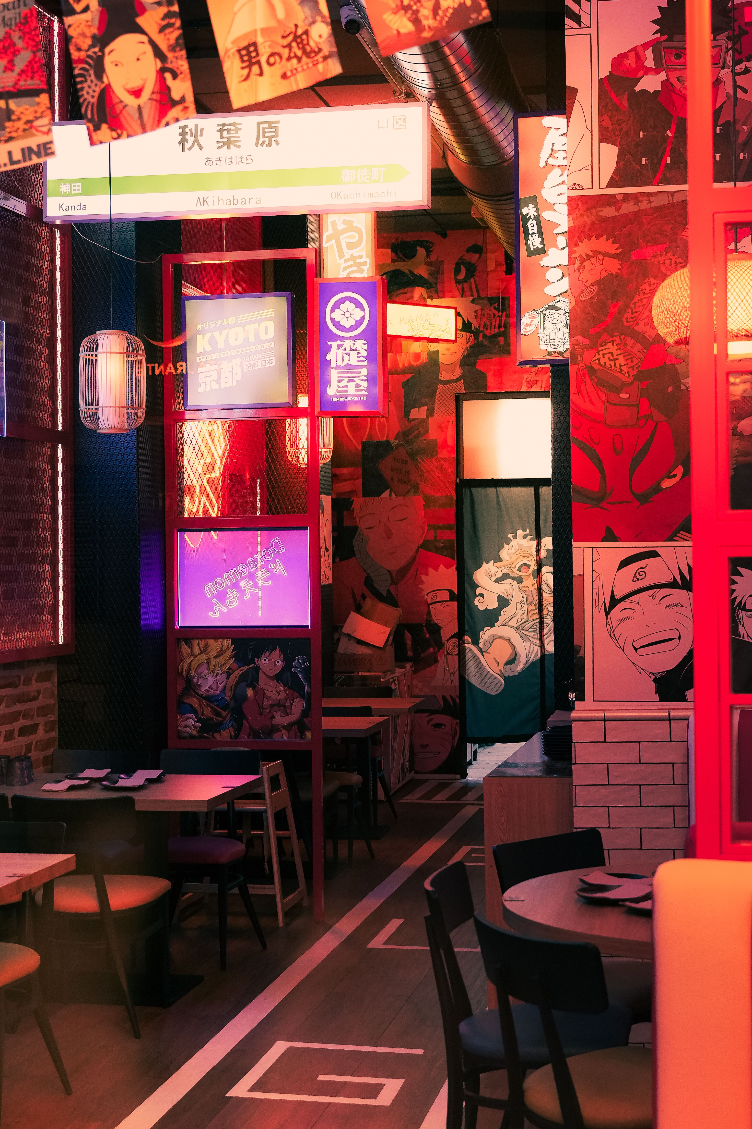 Vibrant Tokyo Anime-Themed Restaurant Interior · Free Stock Photo