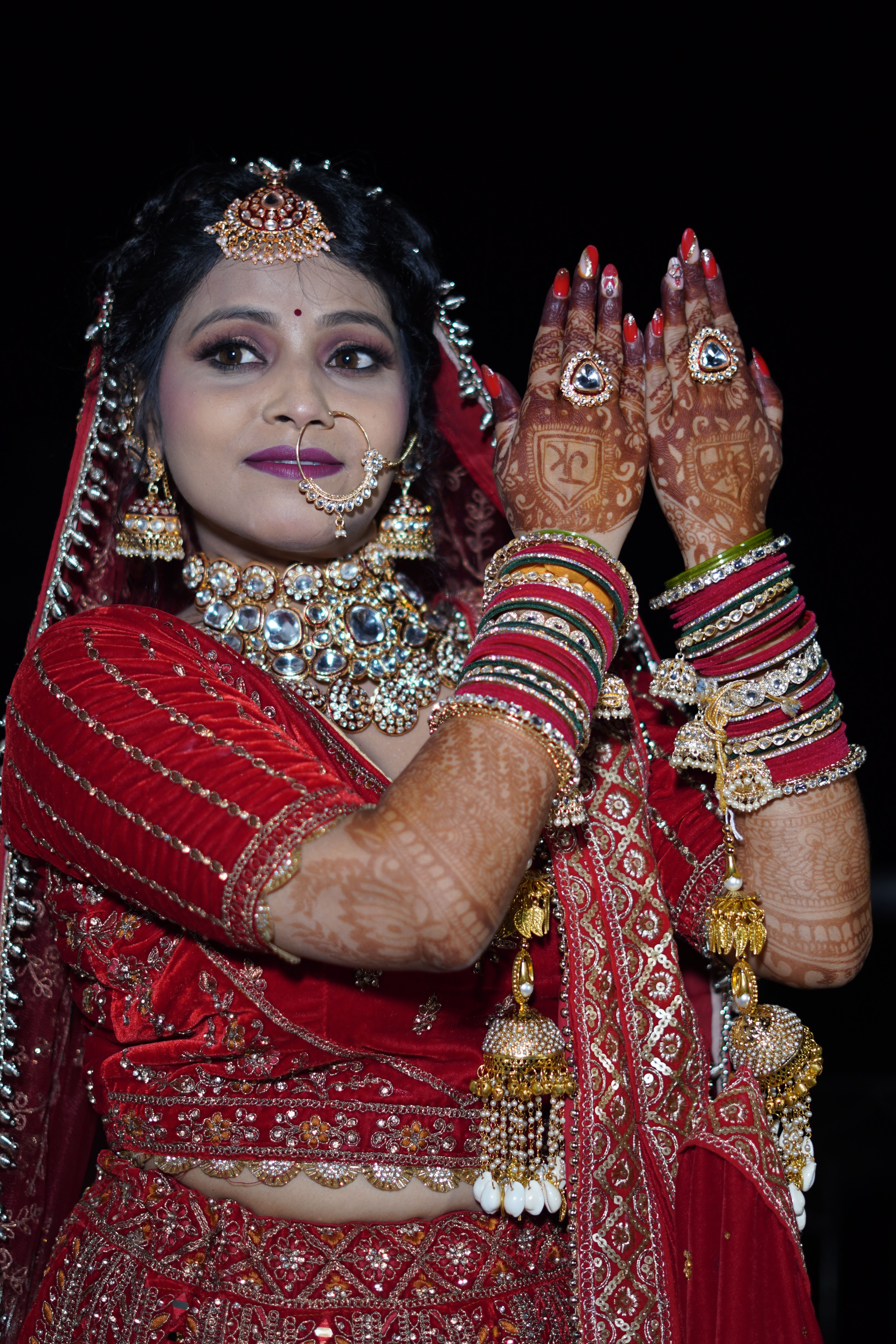 Elegant Indian Bride in Traditional Red Attire · Free Stock Photo